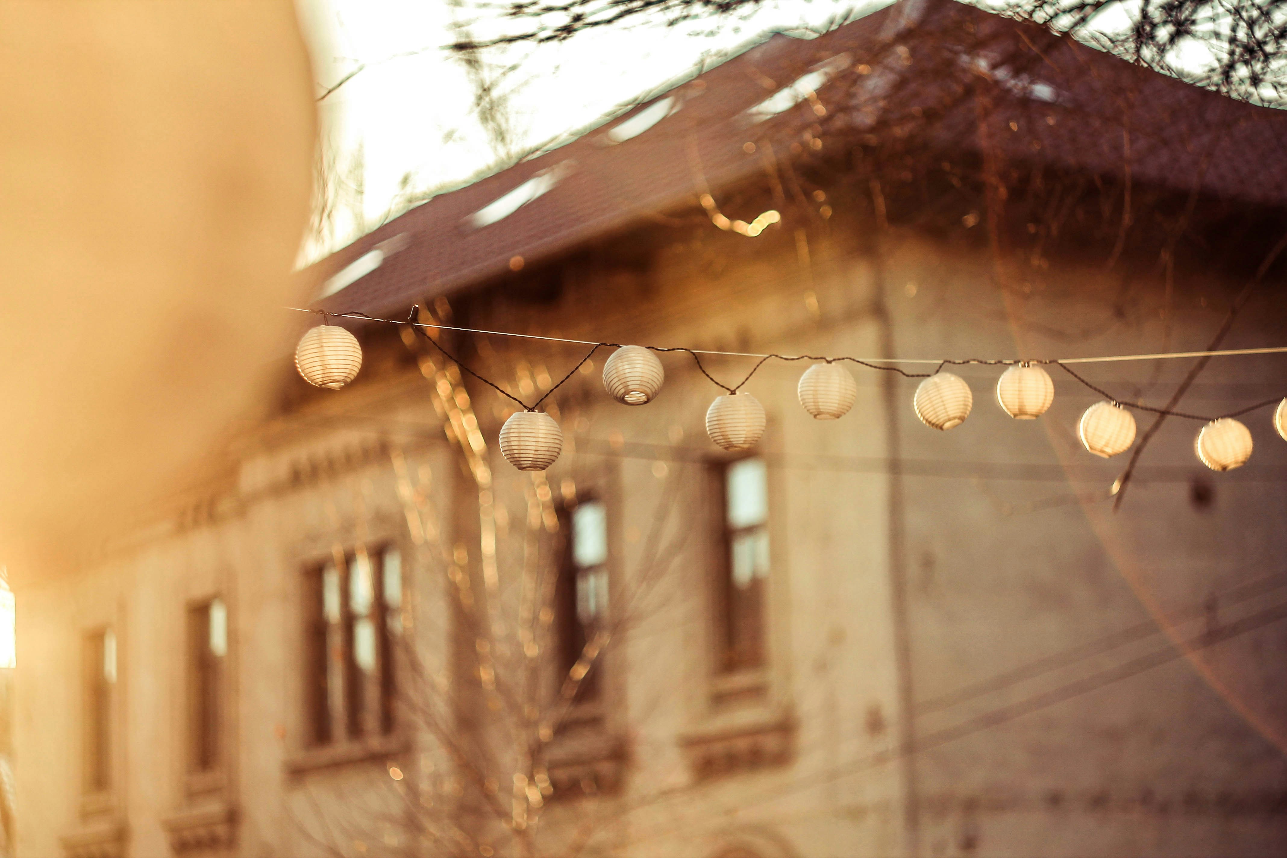 Whispers of Warmth: Lanterns in the Golden Hour