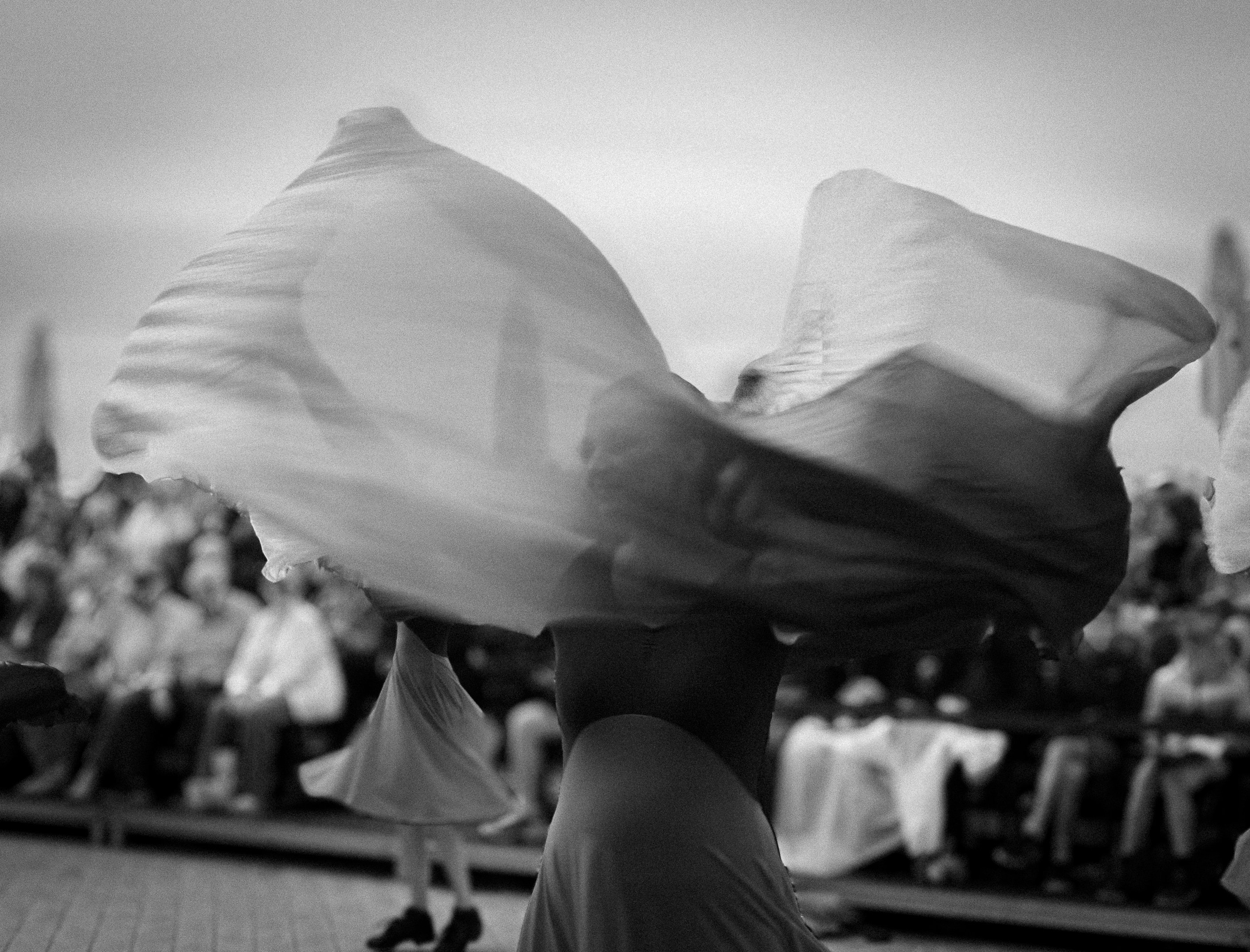 Whispers of Motion: A Dance in Fabric
