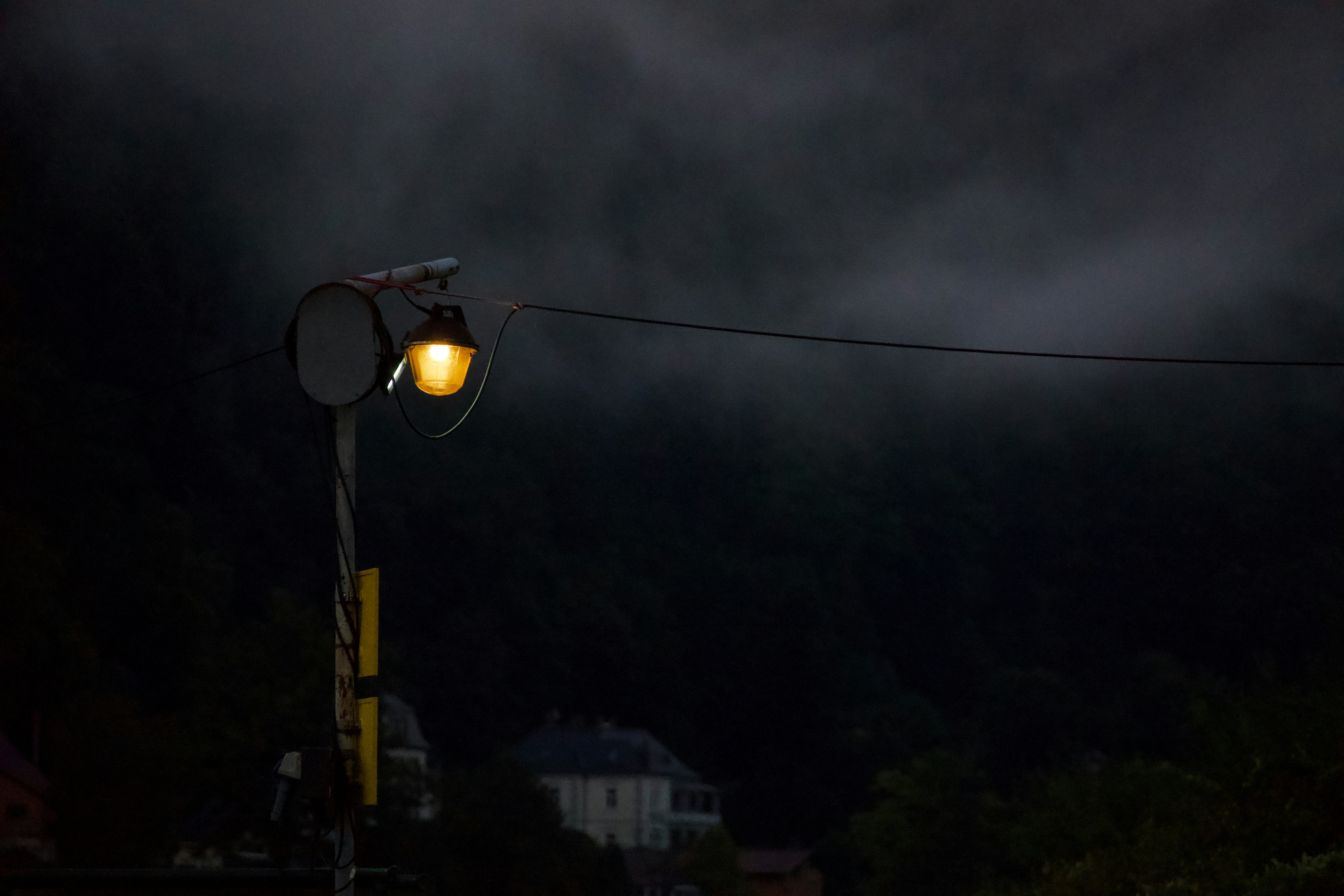 Illuminated Solitude: A Beacon in the Mist