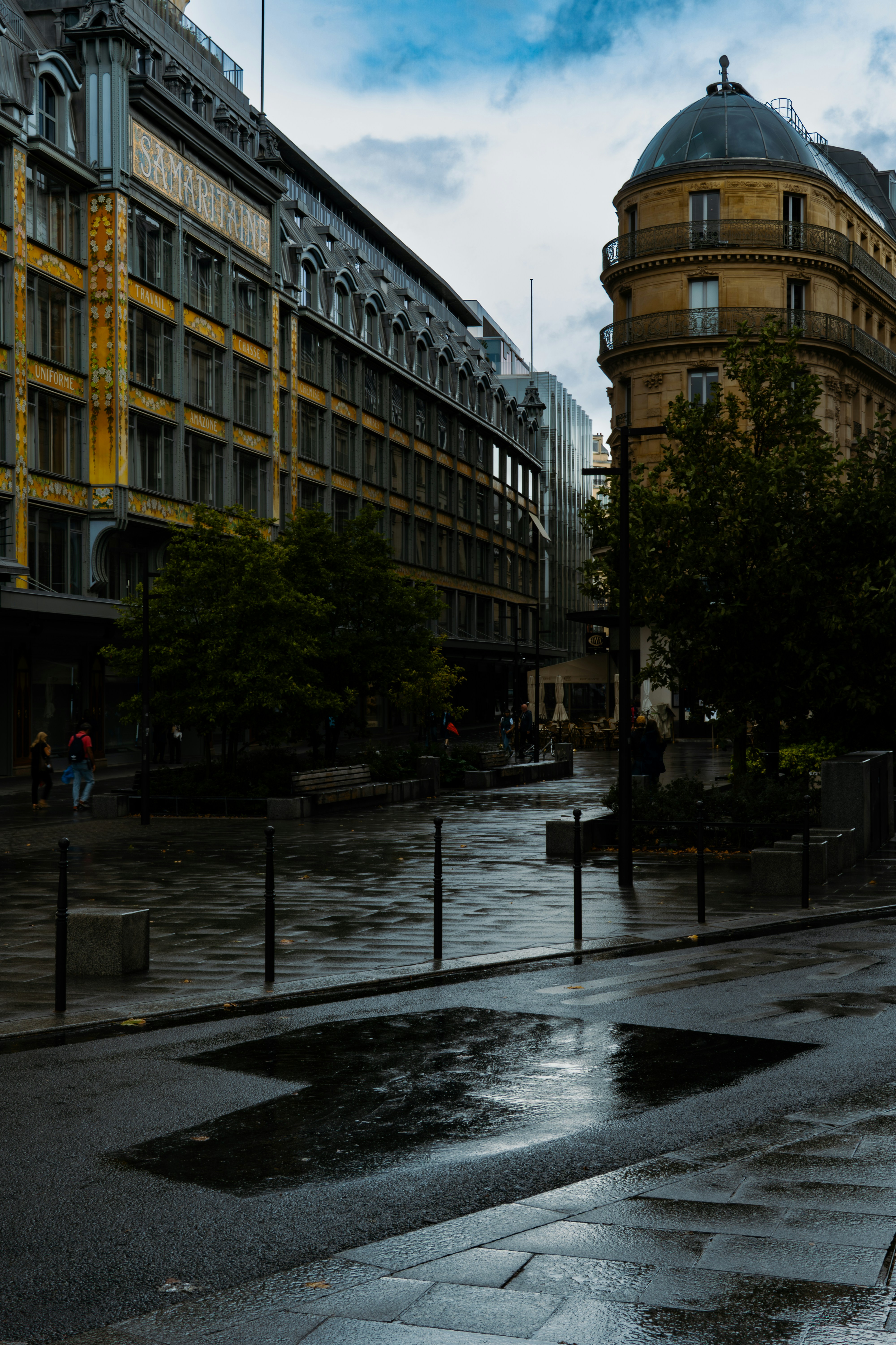 A shot of a rainy day in nice location in Paris | Wet city street with reflections after rain