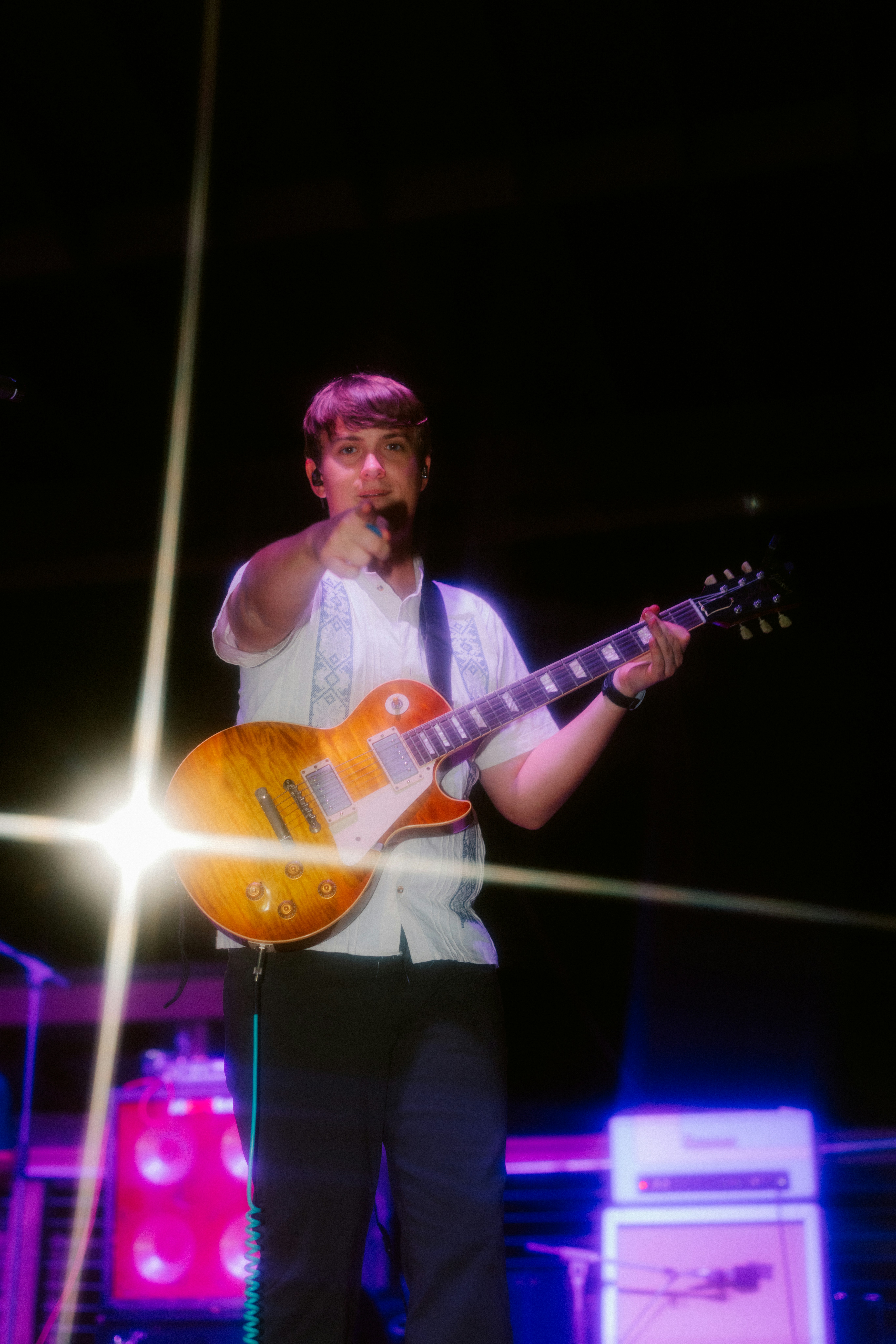 Guitar Maestro Under Stage Lights