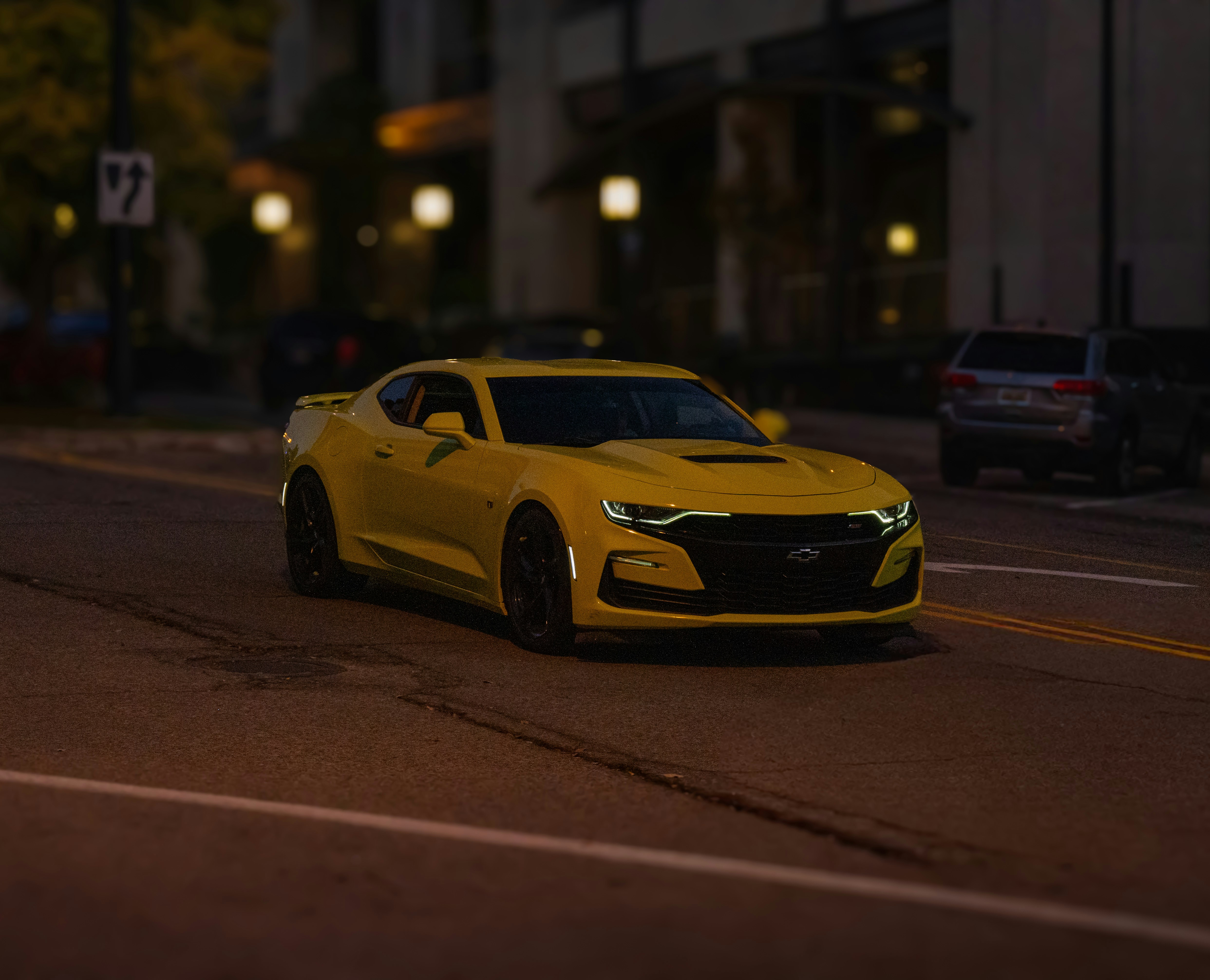 Urban Velocity: The Bold Yellow Camaro