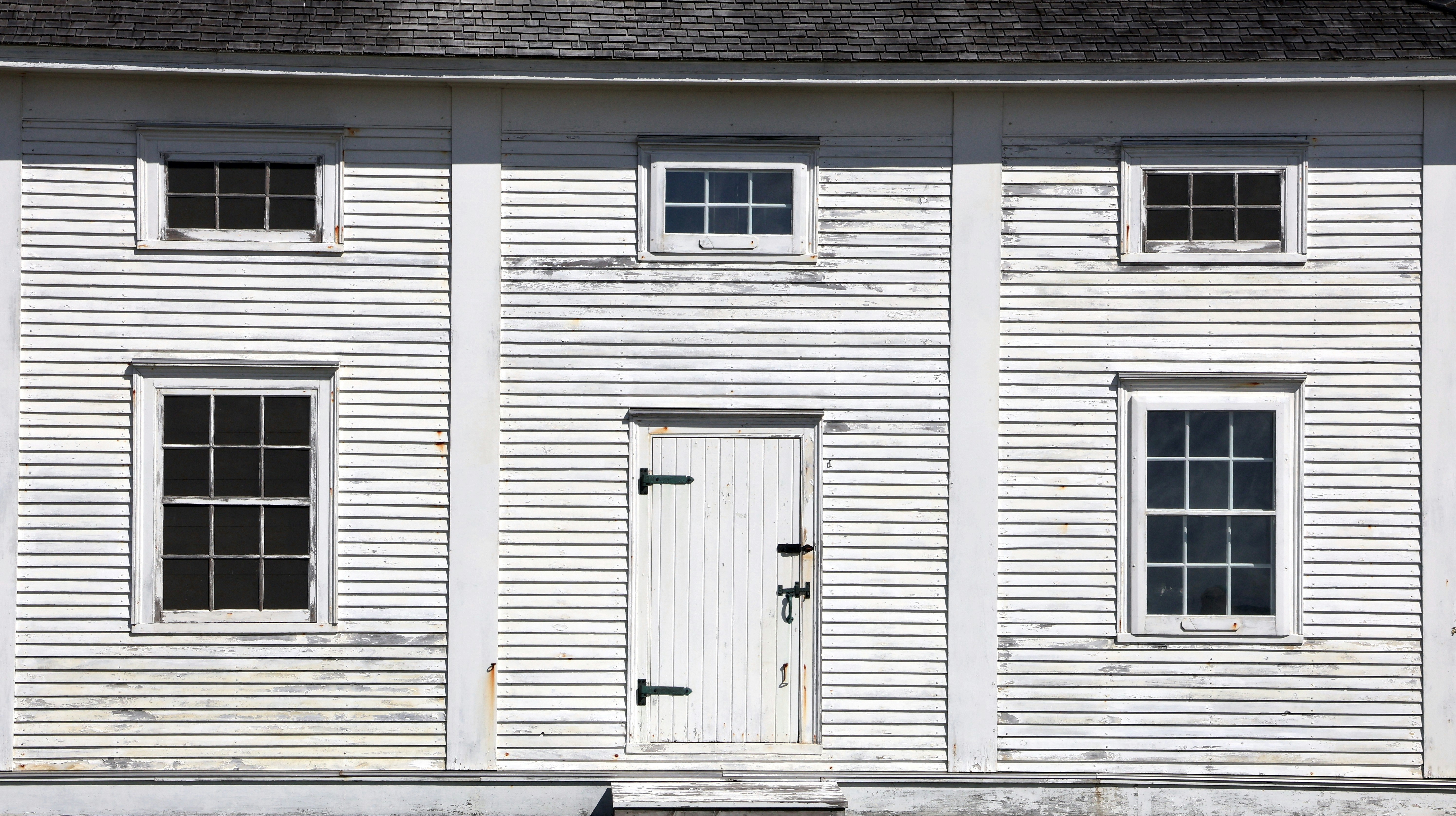 Whispers of Time: The Weathered Facade
