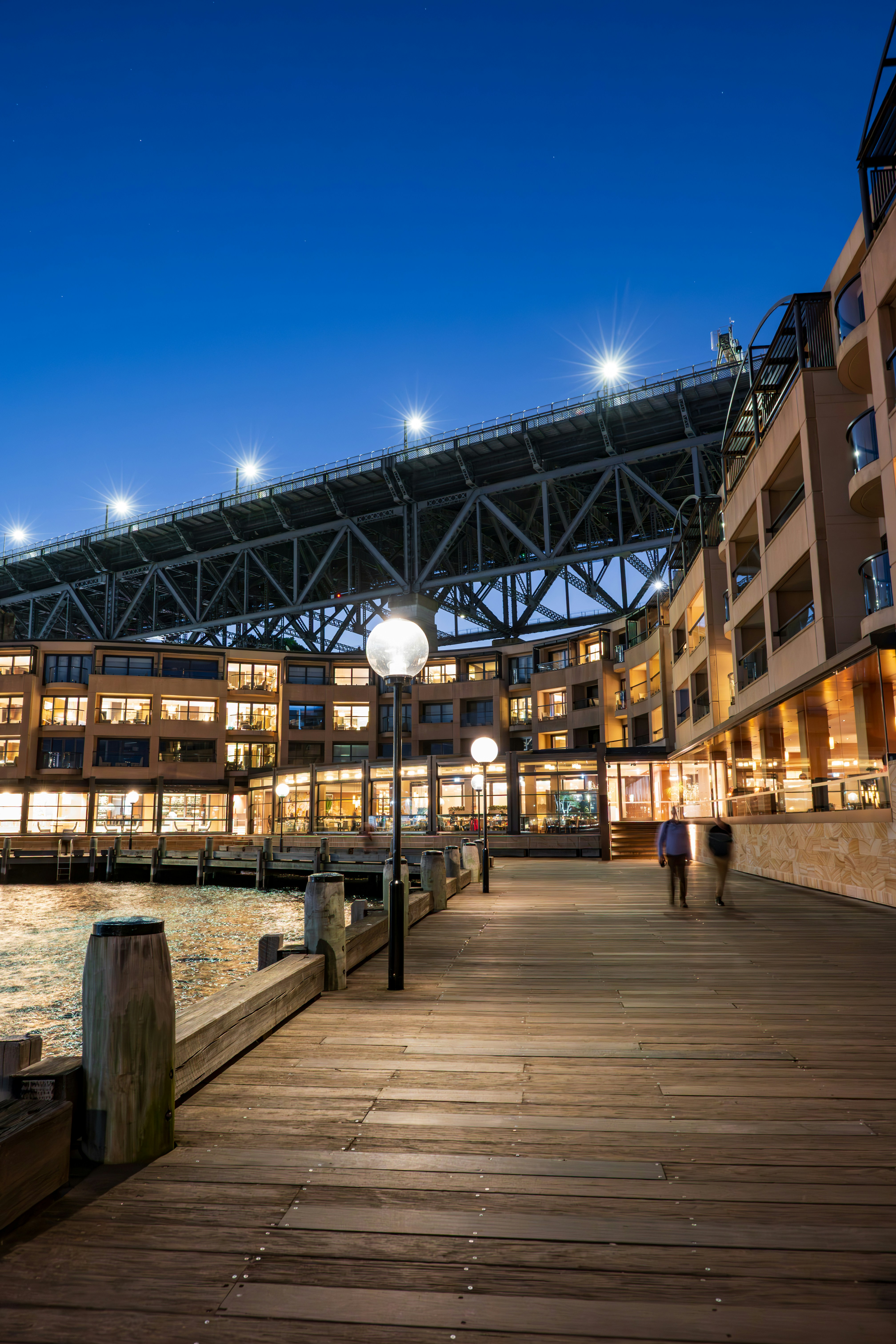 Evening Stroll Under the Bridge