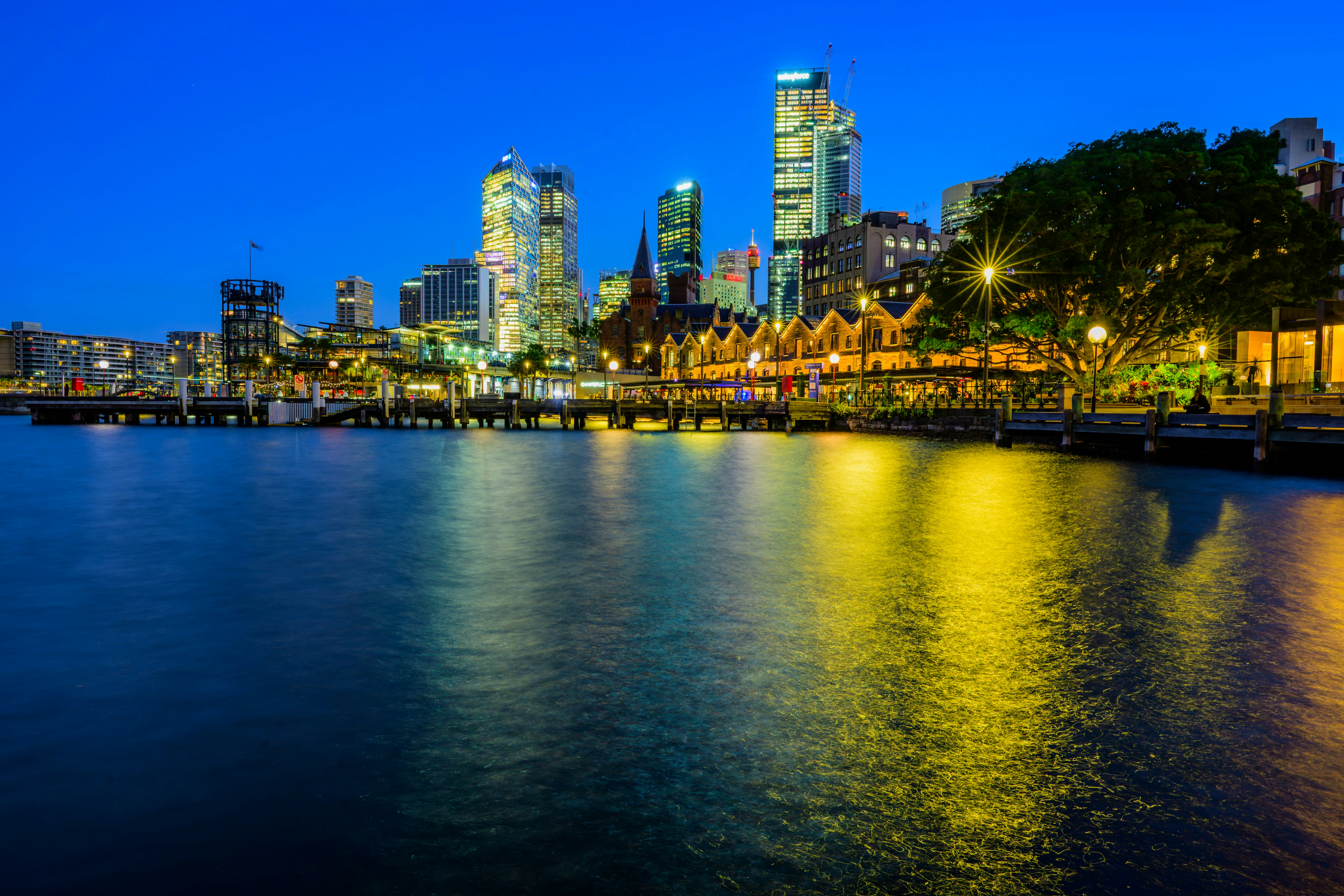 City skyline reflected in the water at dusk