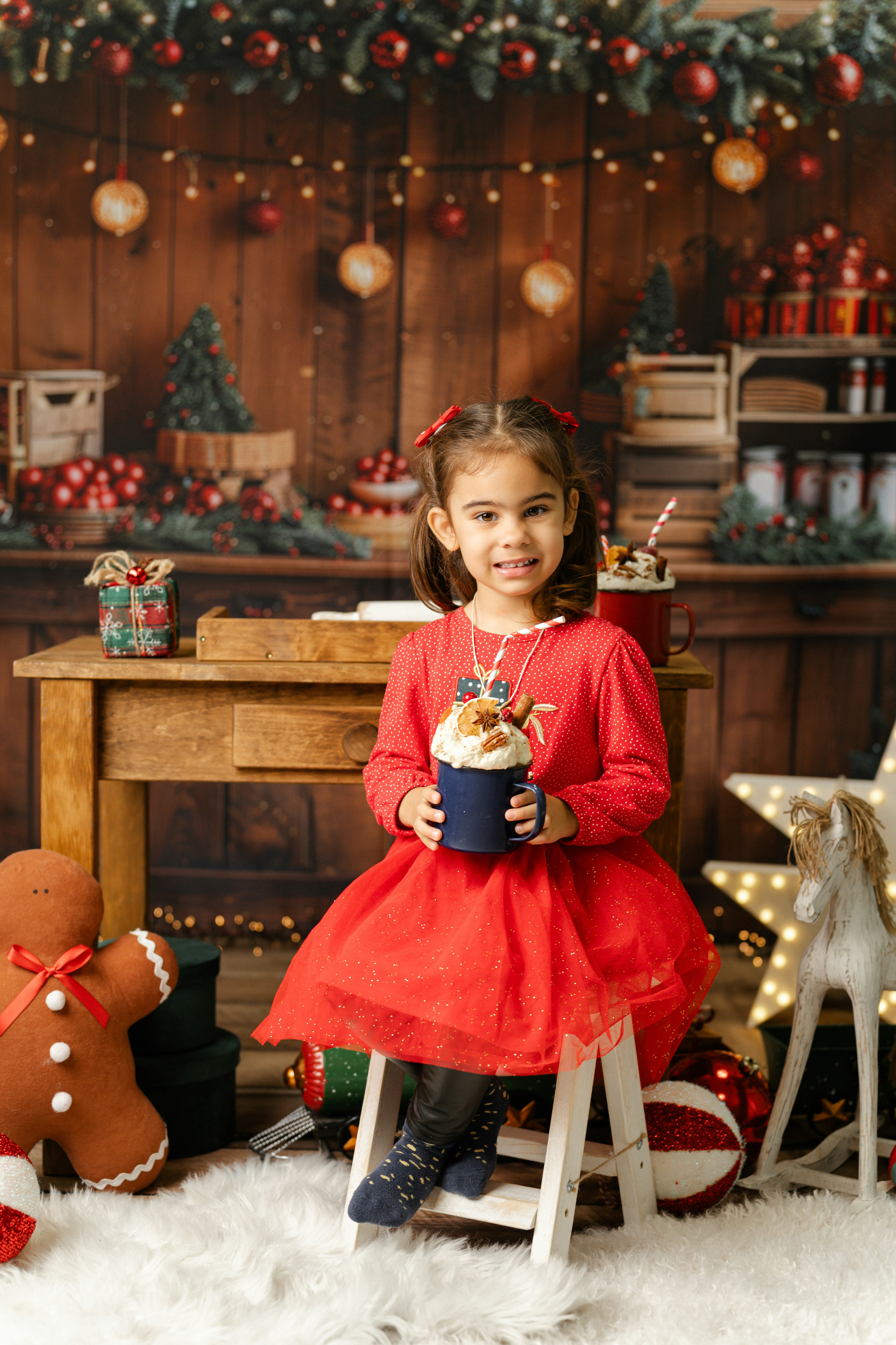 Cozy Cocoa Moment: A Red-Dress Cheer in a Rustic Christmas Studio