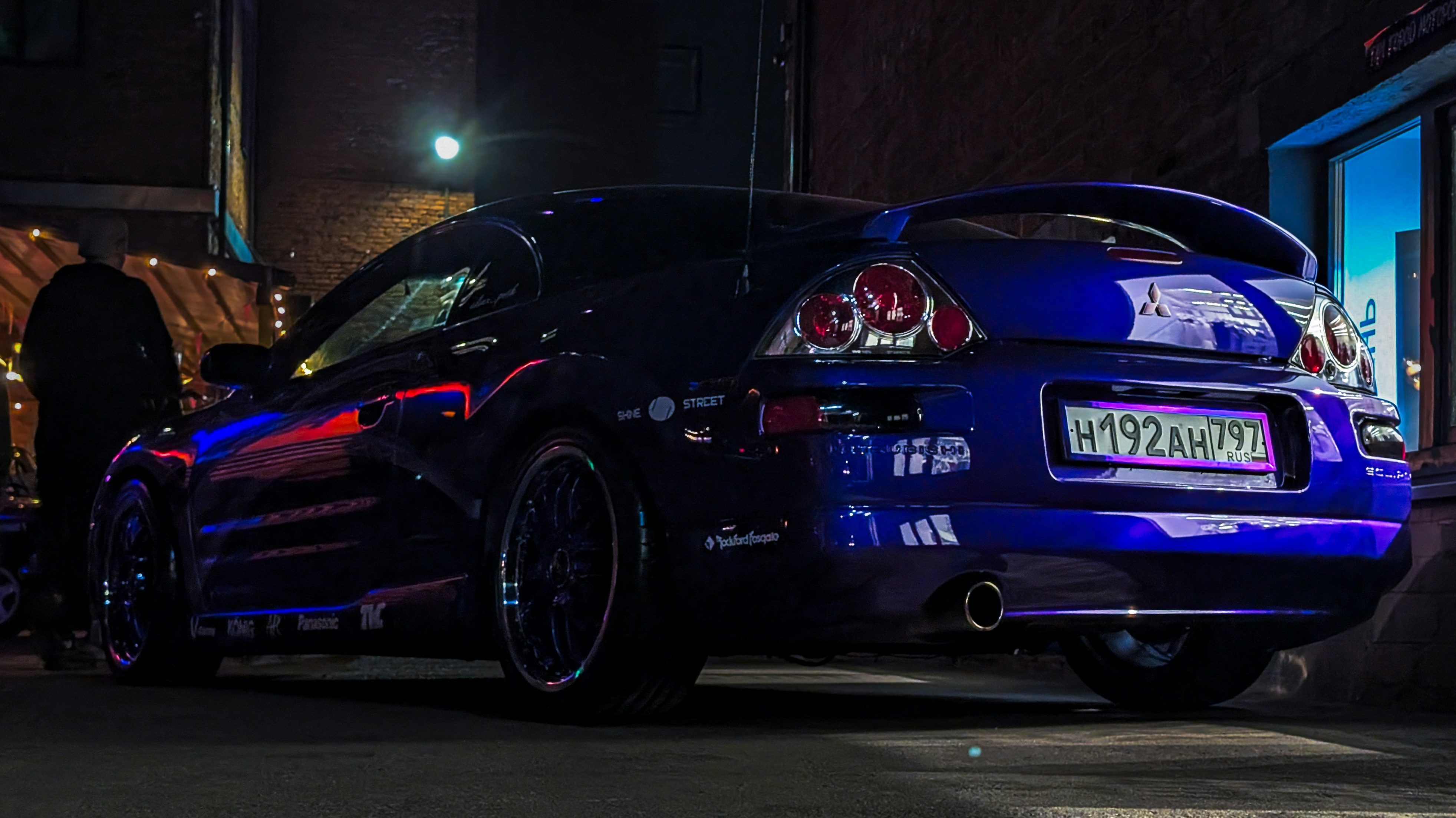Moonlit Blue Streak: Nighttime Street Portrait of a Sport Coupe
