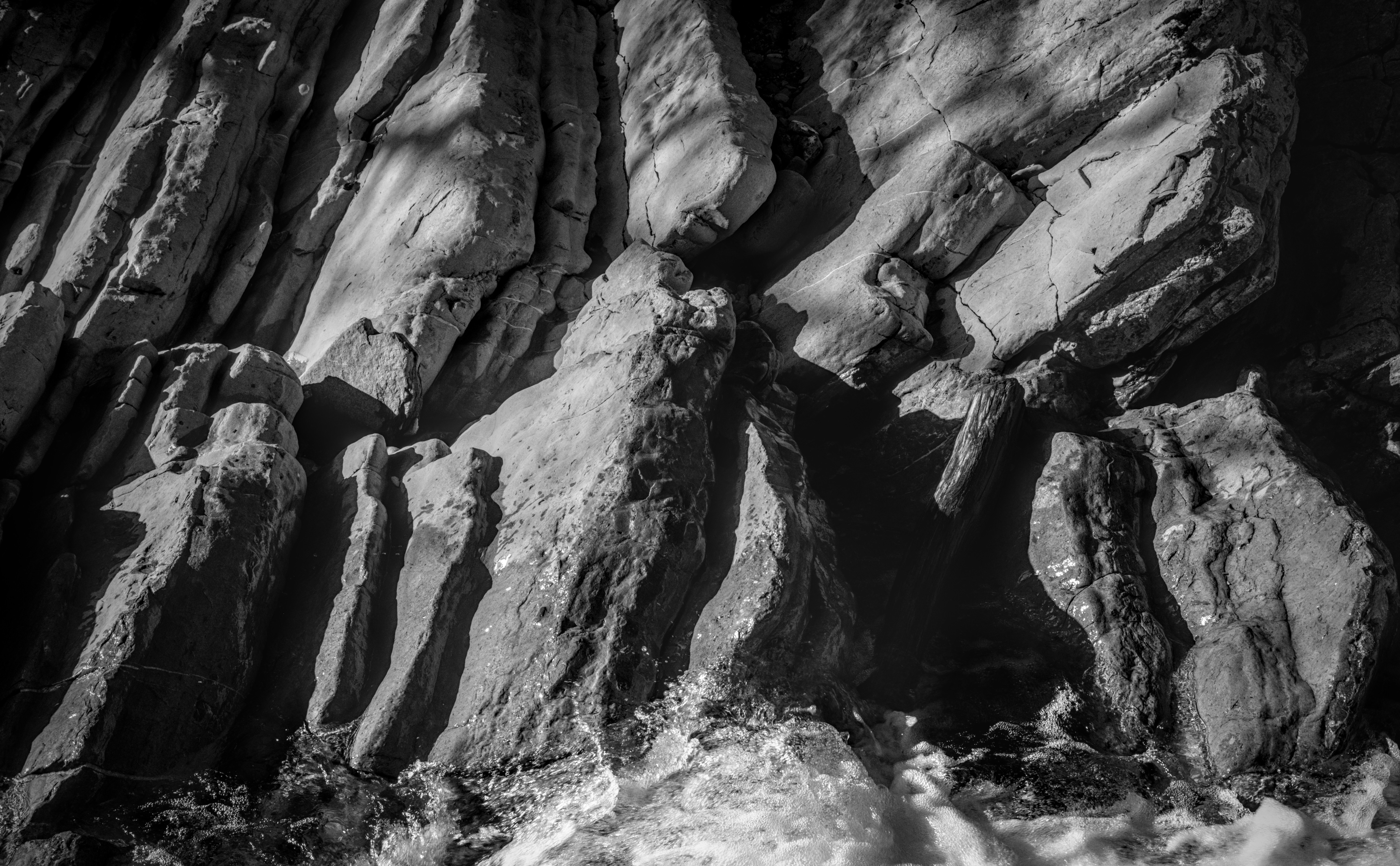 Jagged rock formations with sunlight and shadow