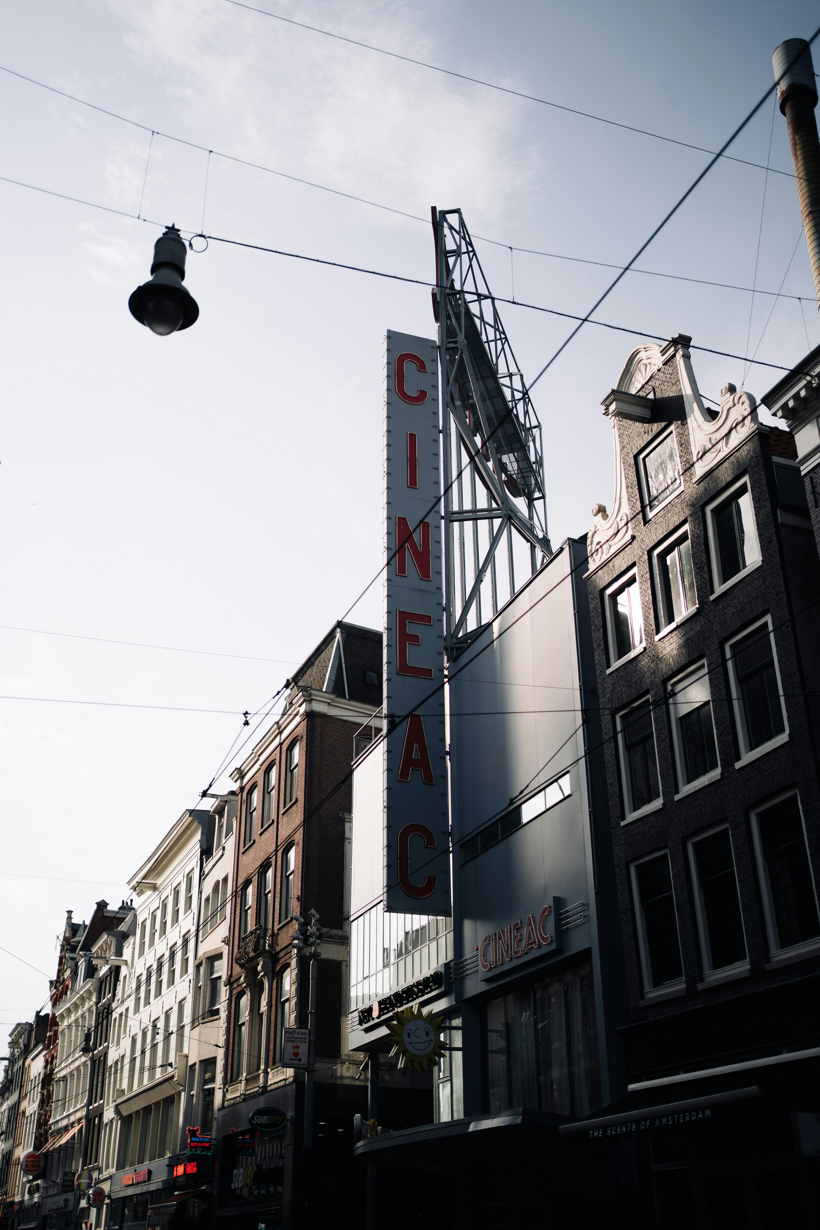 Cinemac sign on a building in a city