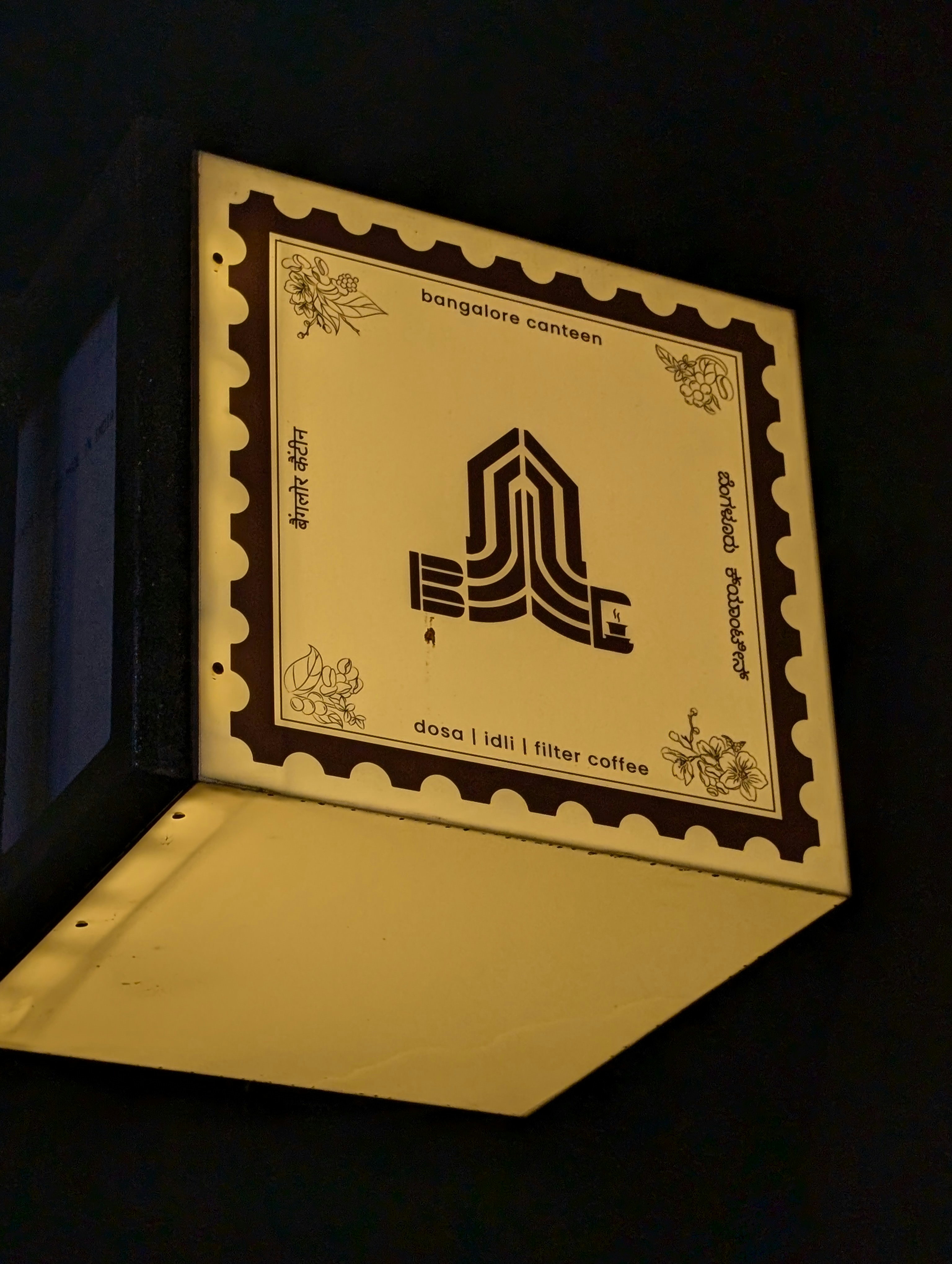 Bisi Bisi machan | Illuminated sign for "bangalore canteen" with logo.