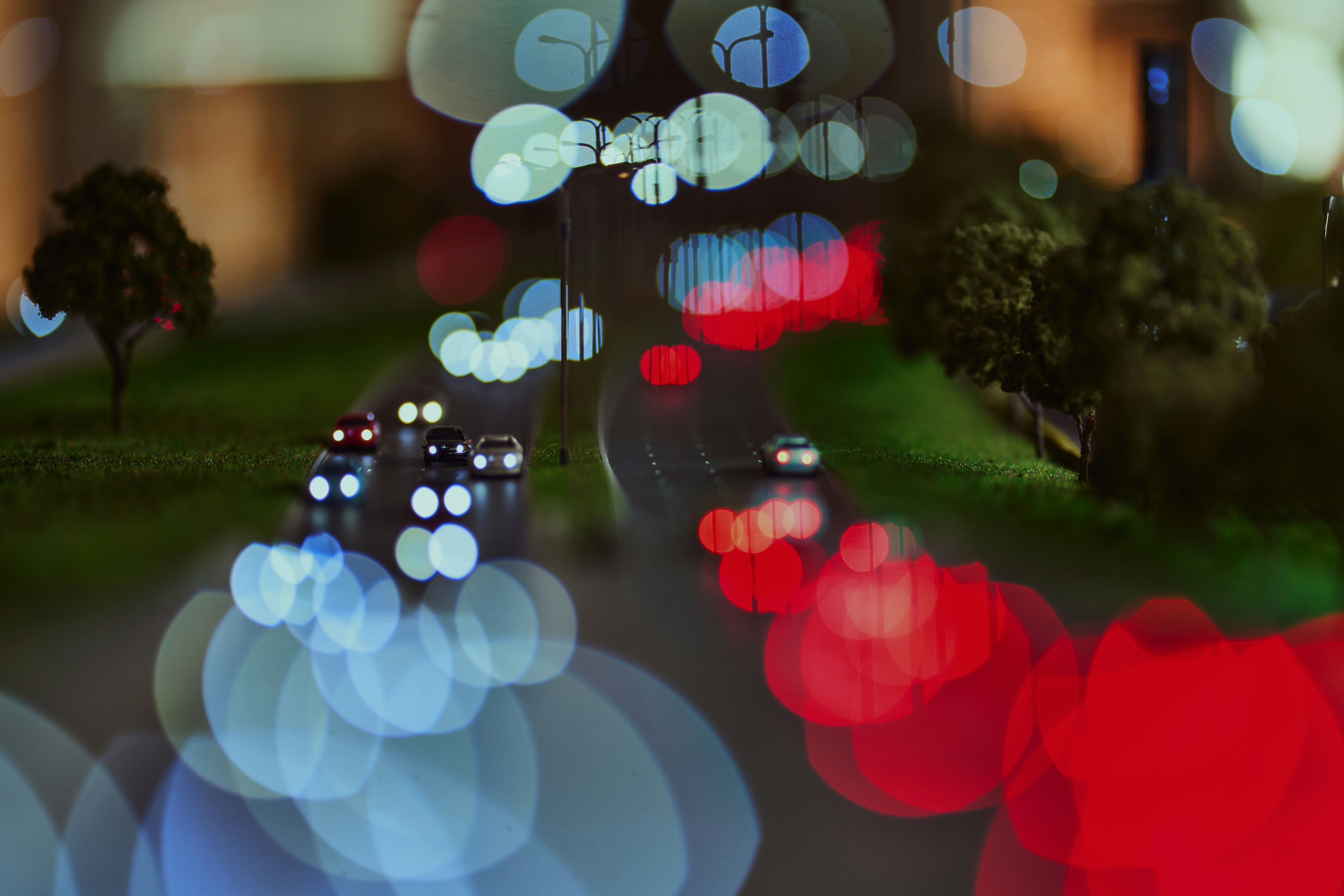 Blurred city lights and car trails at night