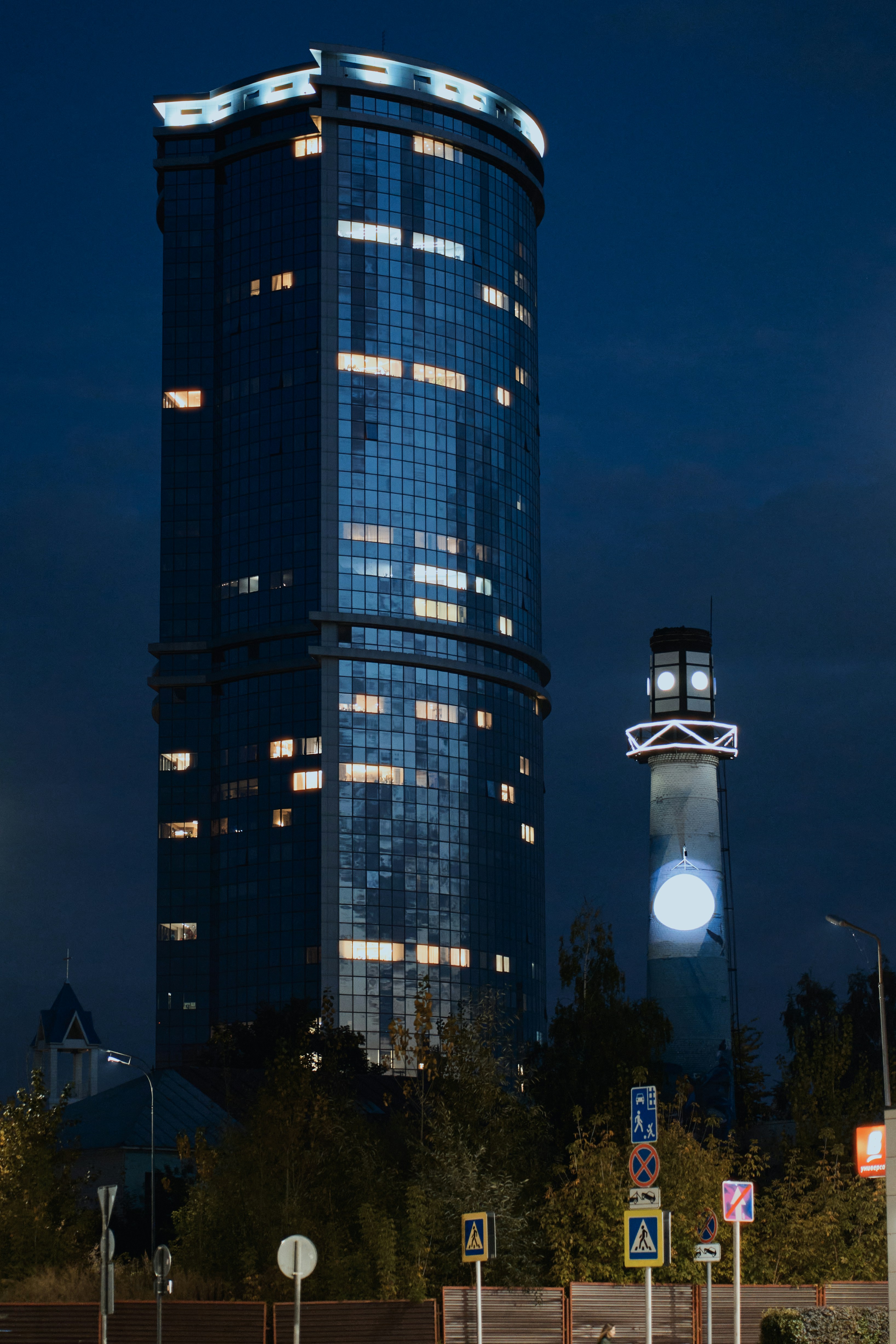 Urban Reflections: A Nighttime Symphony of Glass and Light