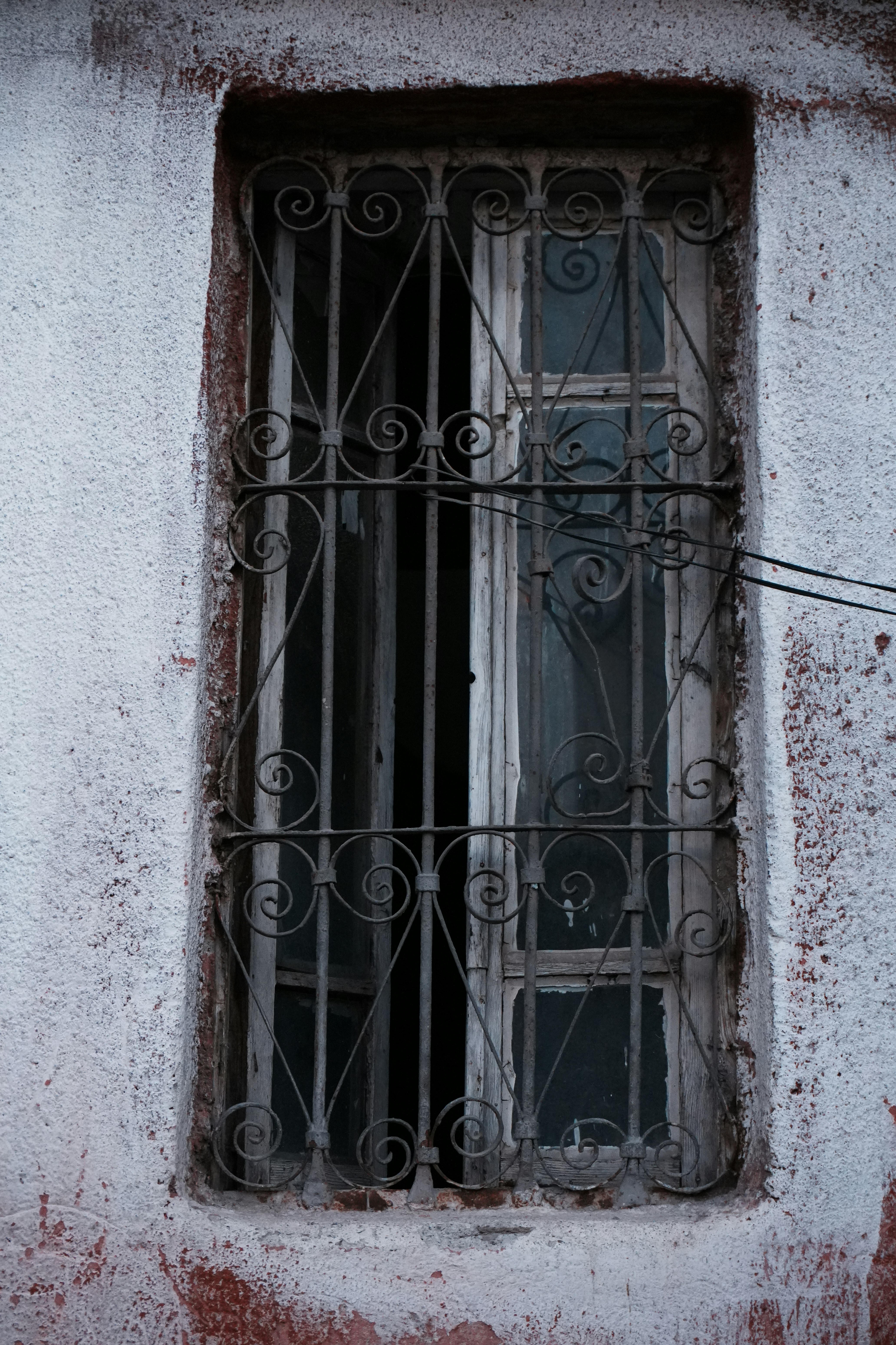 Whispers of Time Behind Iron Bars