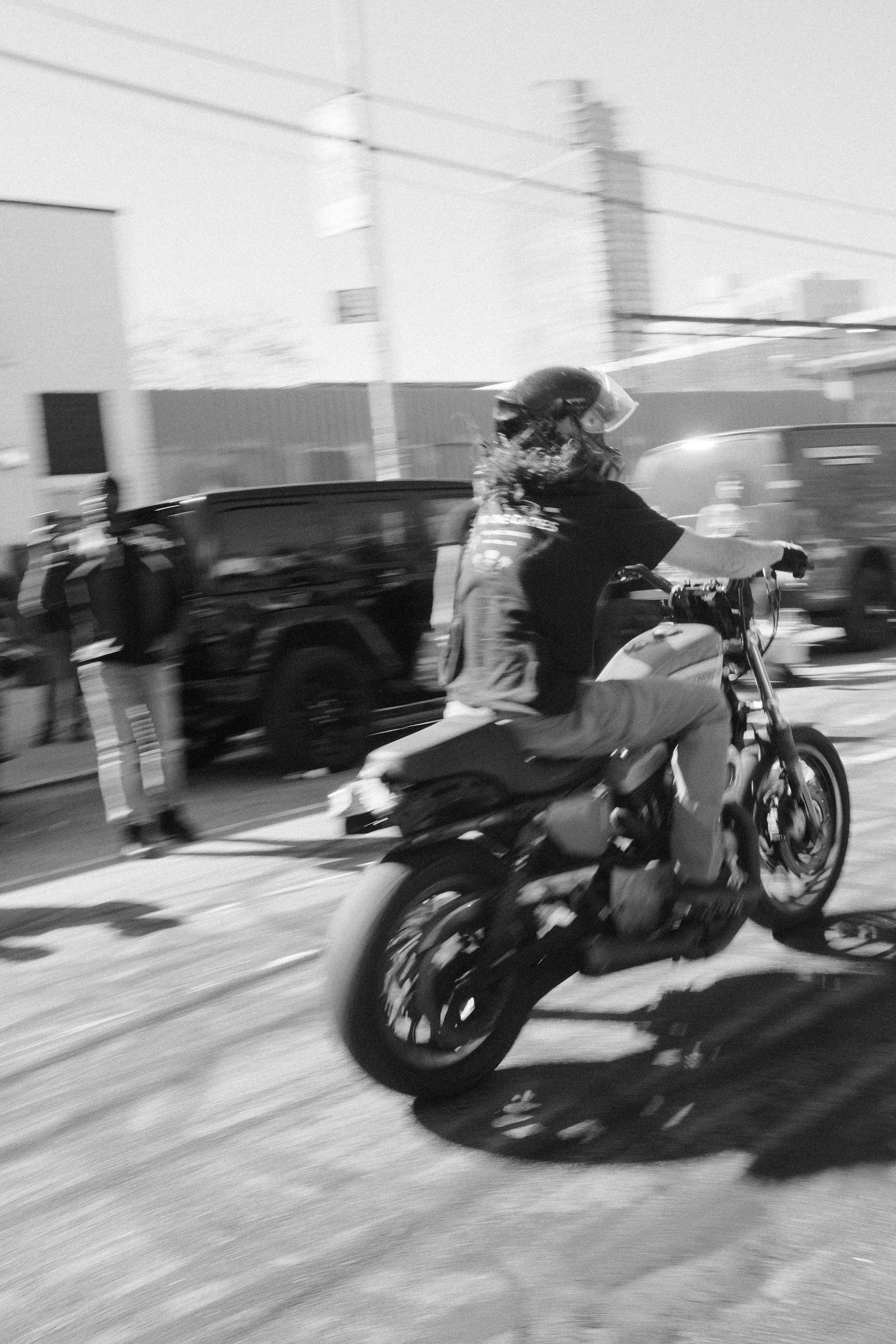 Velocity in Monochrome: A Ride Through the Urban Pulse