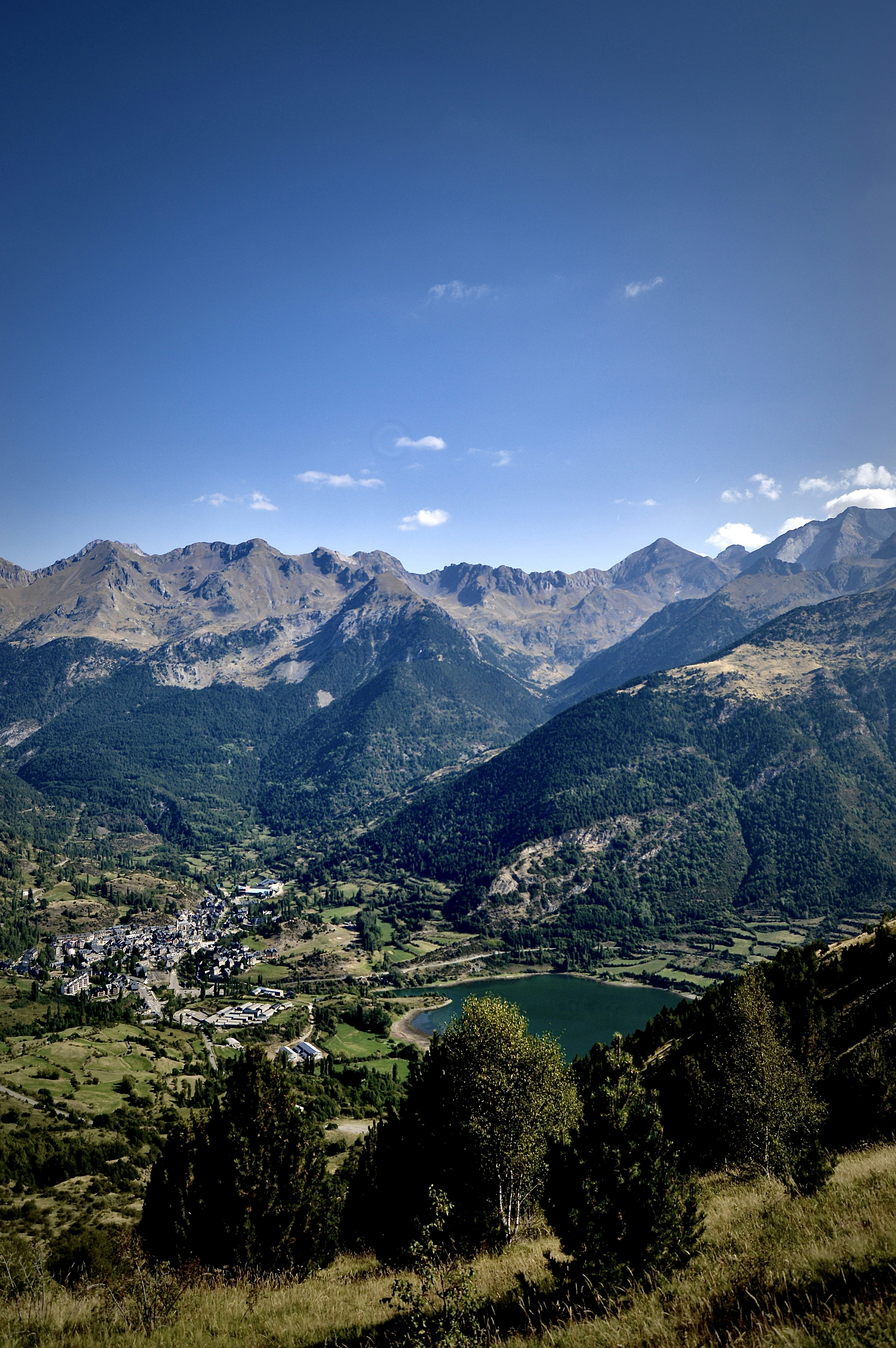 Mountain village nestled beside a serene lake