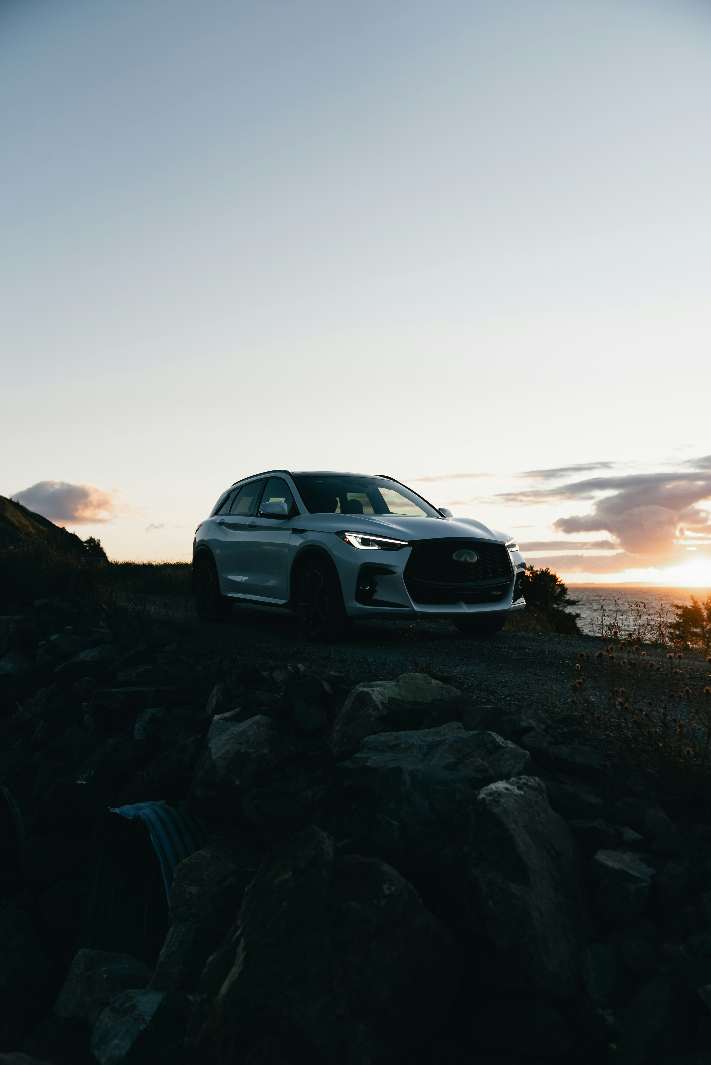 Sunlit Silver Arrow perched above a rugged coastal overlook