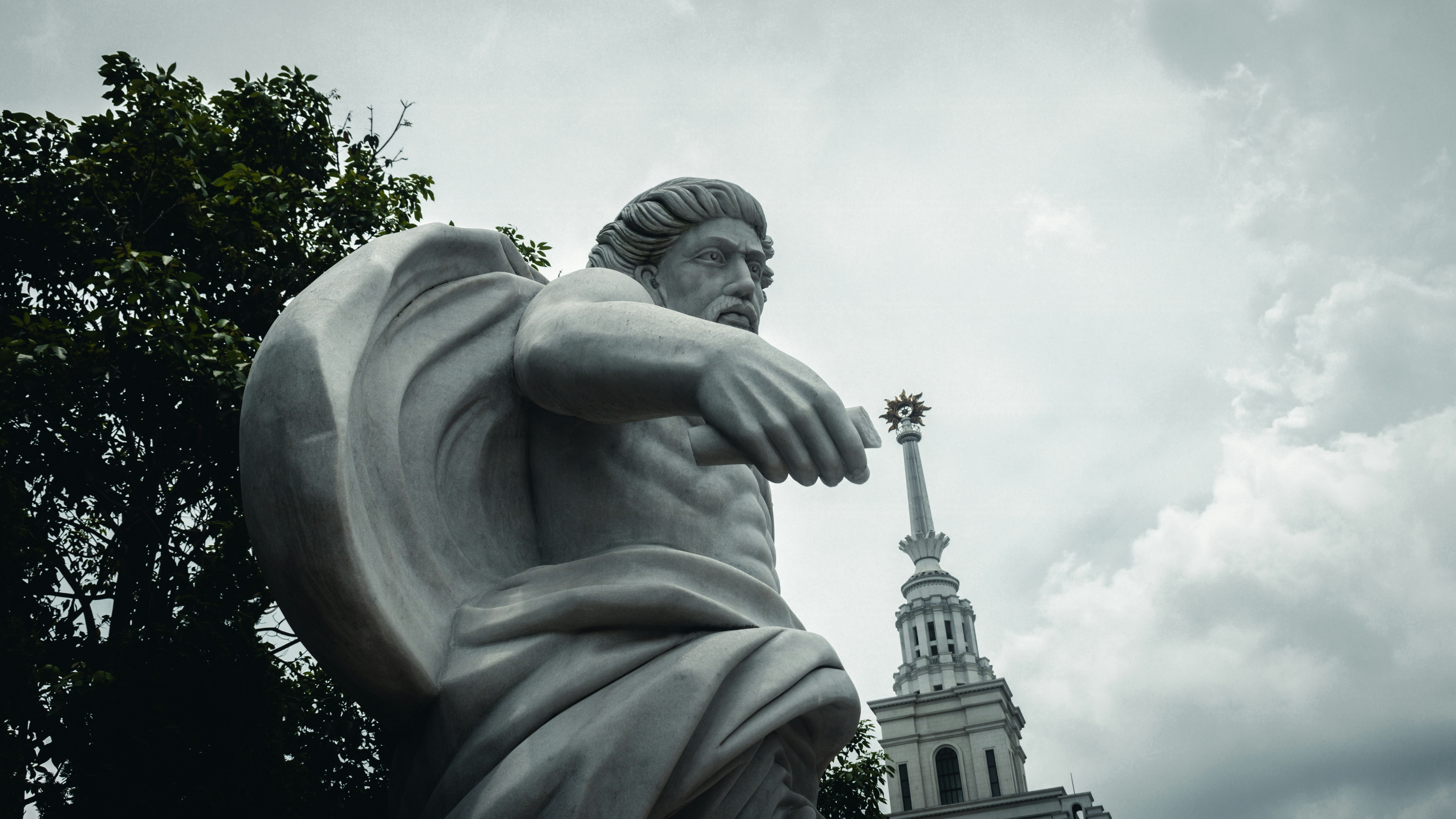 Stone Titan Under a Steepled Sky