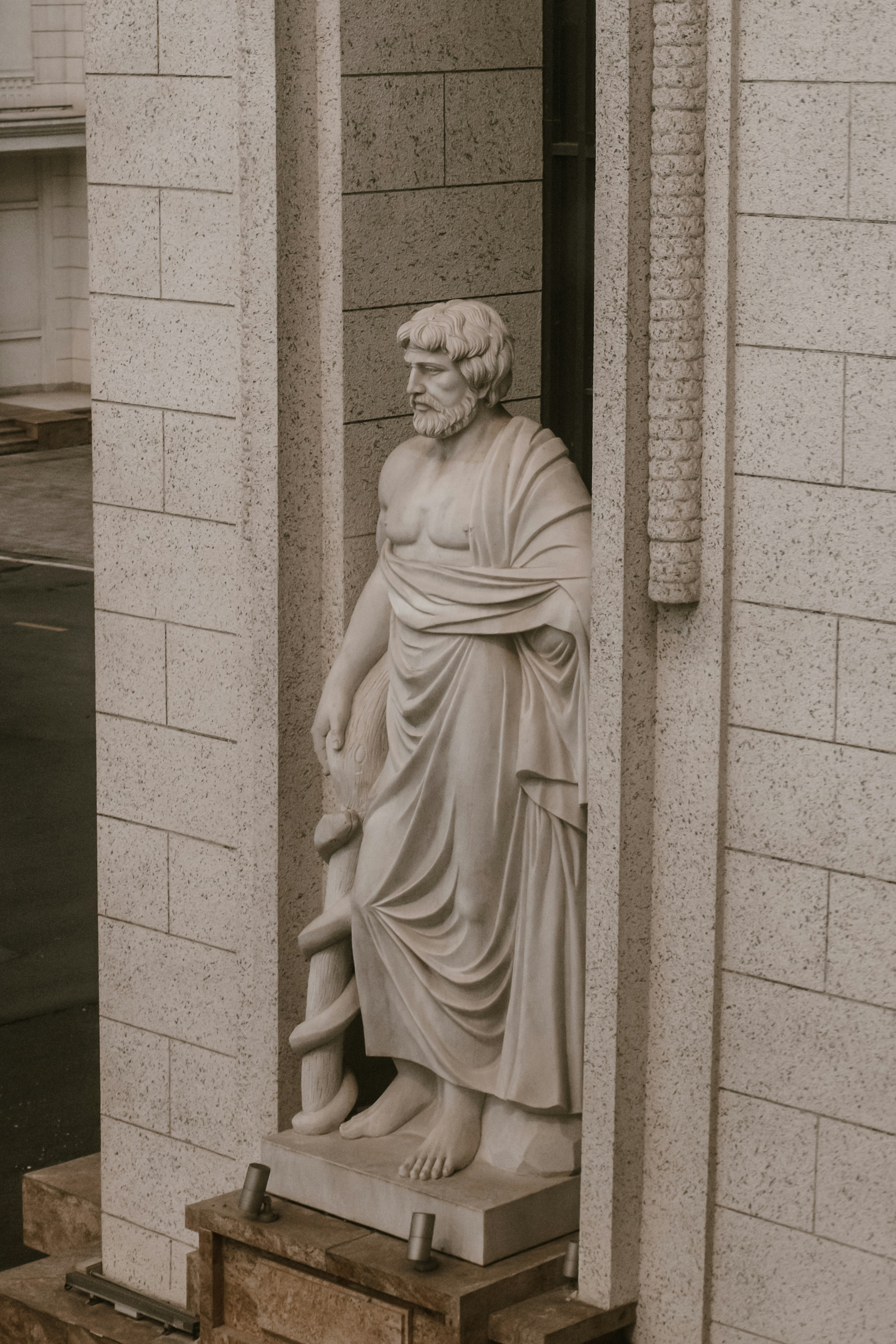 Guardian of Wisdom: The Timeless Figure in Stone