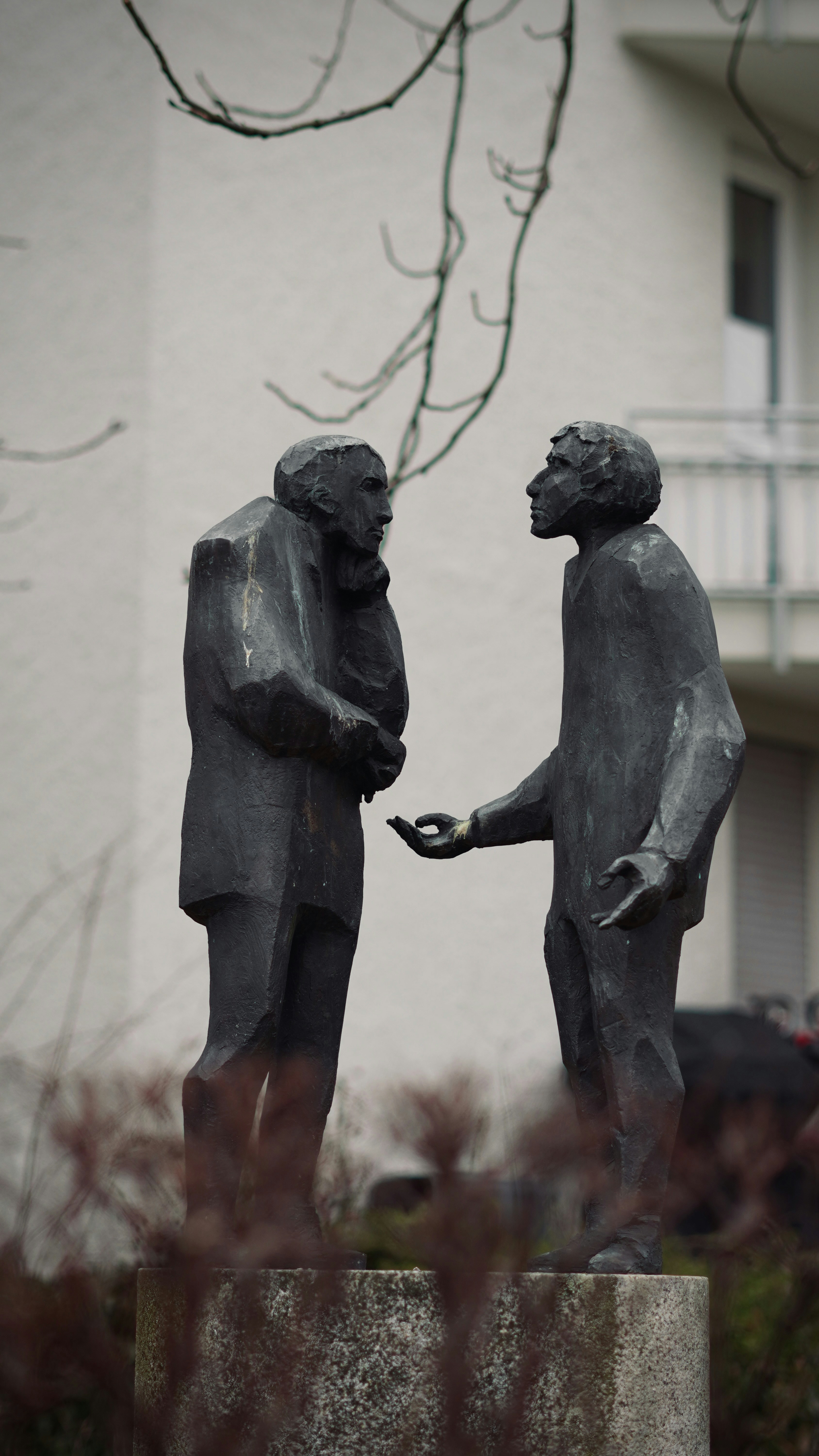 Bronze Dialogues: A Quiet Exchange Between Two Figures