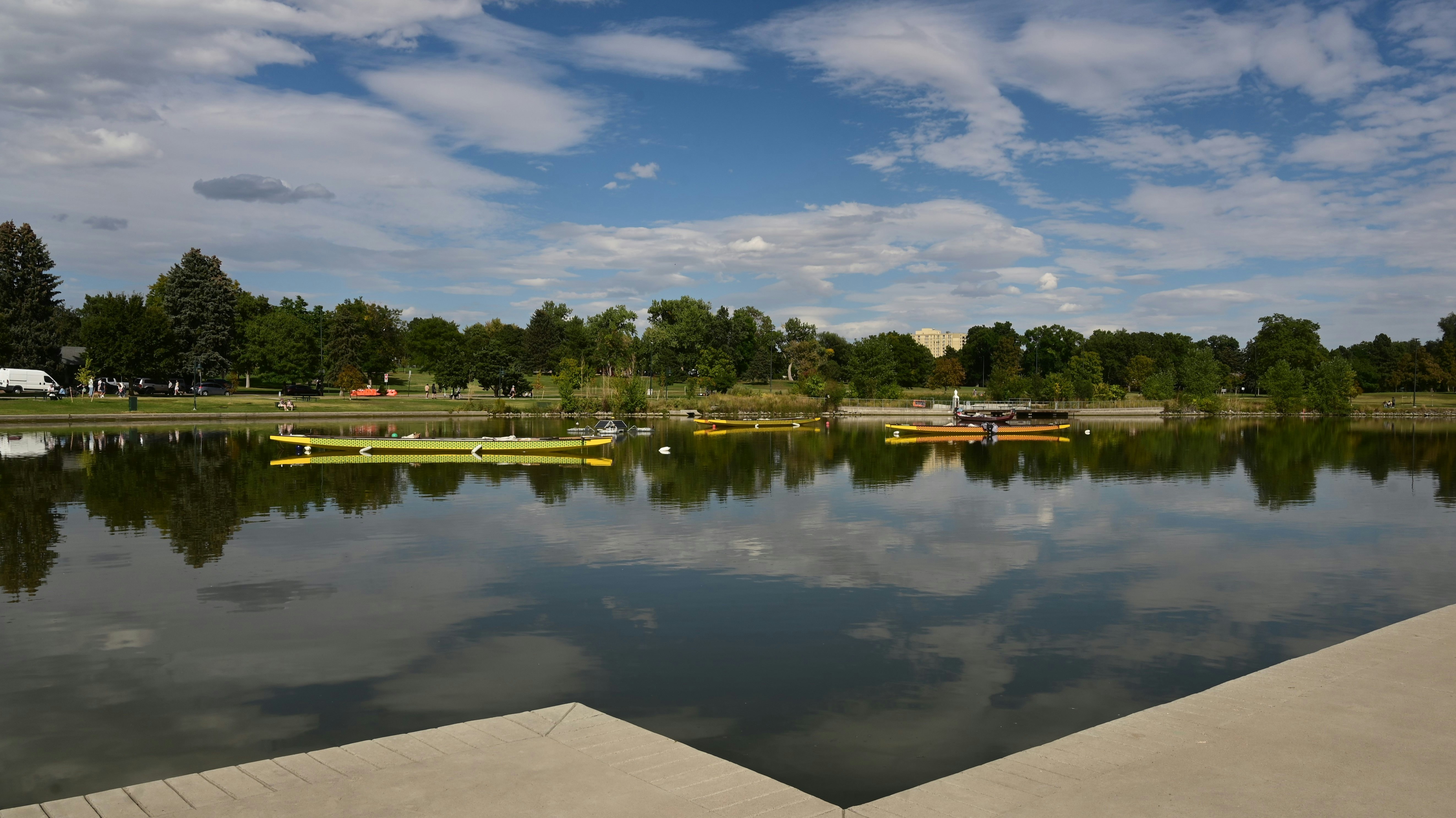 Quiet Marina Reflections: Boats Rest on a Glassy Lake