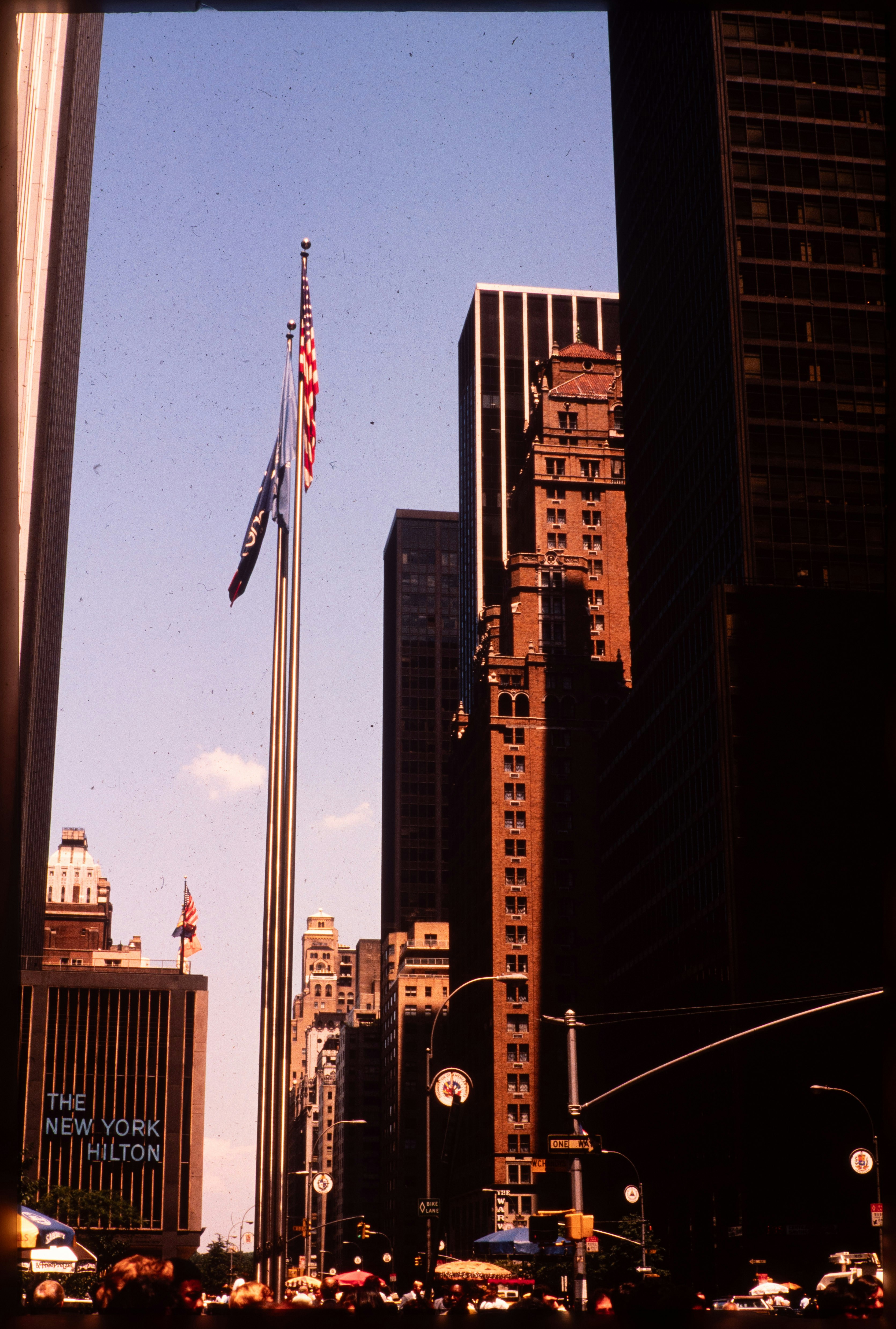 OLYMPUS DIGITAL CAMERA | New york city skyline with buildings and flags