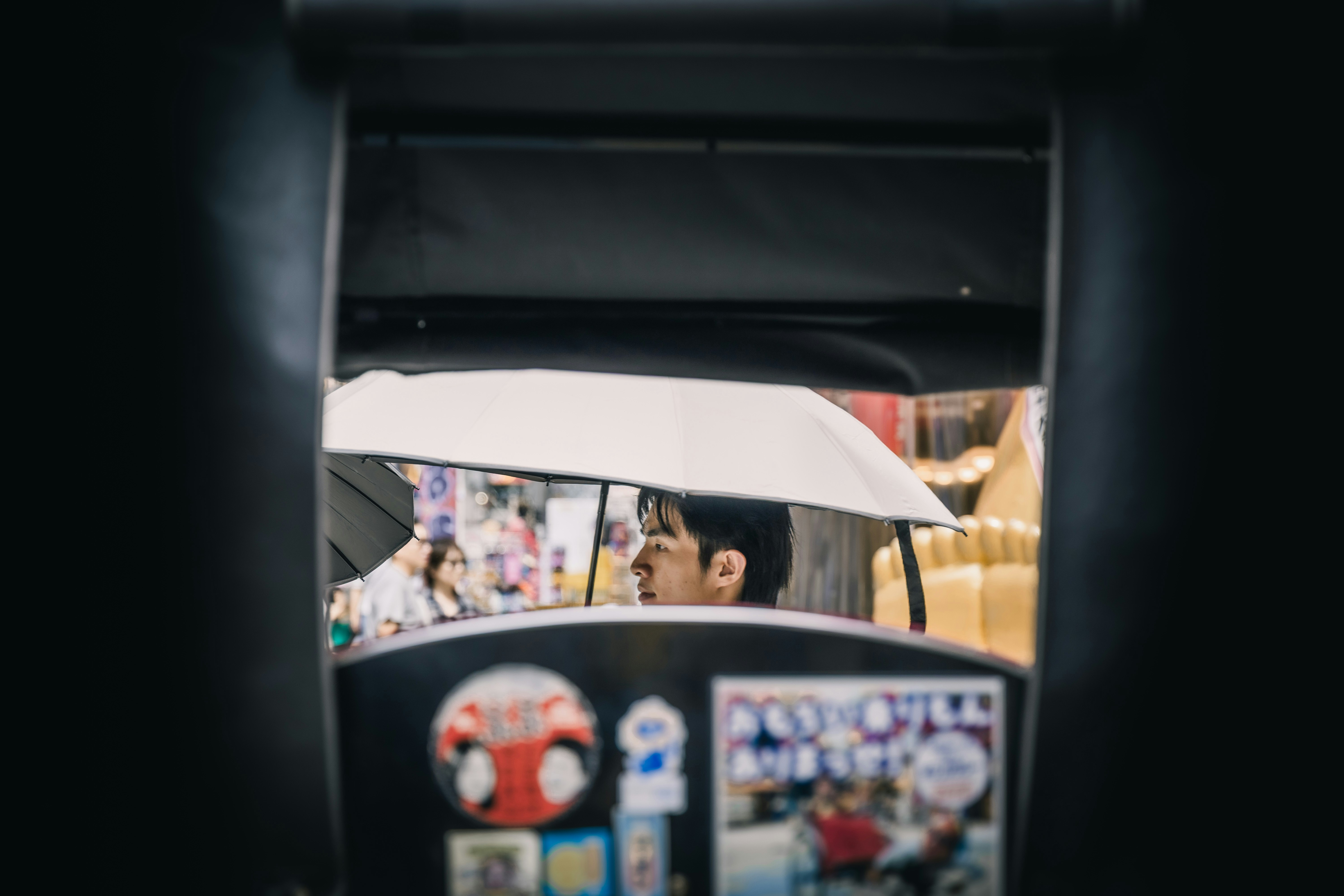 Urban Shelter: A Moment Under the Umbrella