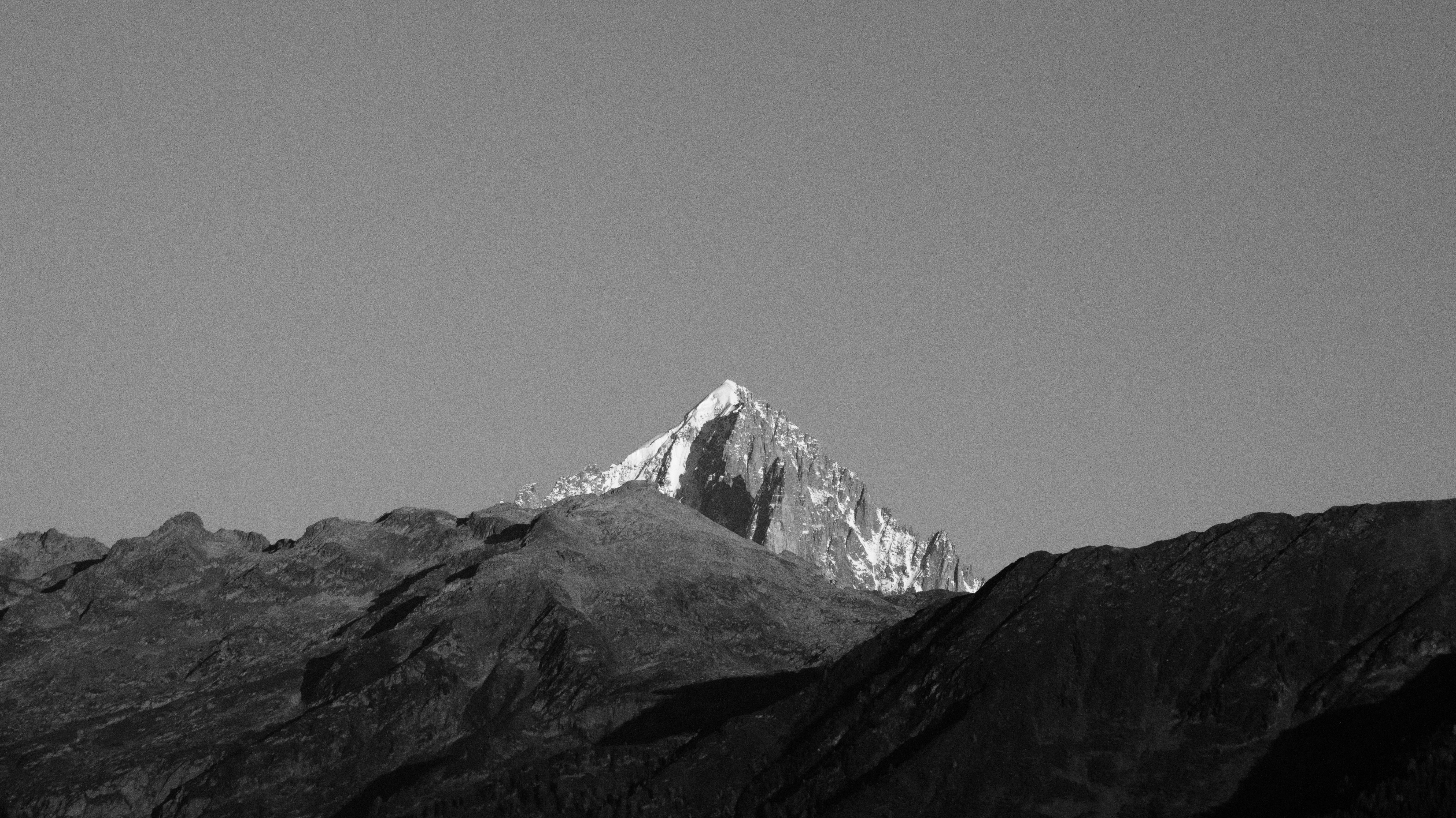 Snow-capped mountain peak under a clear sky
