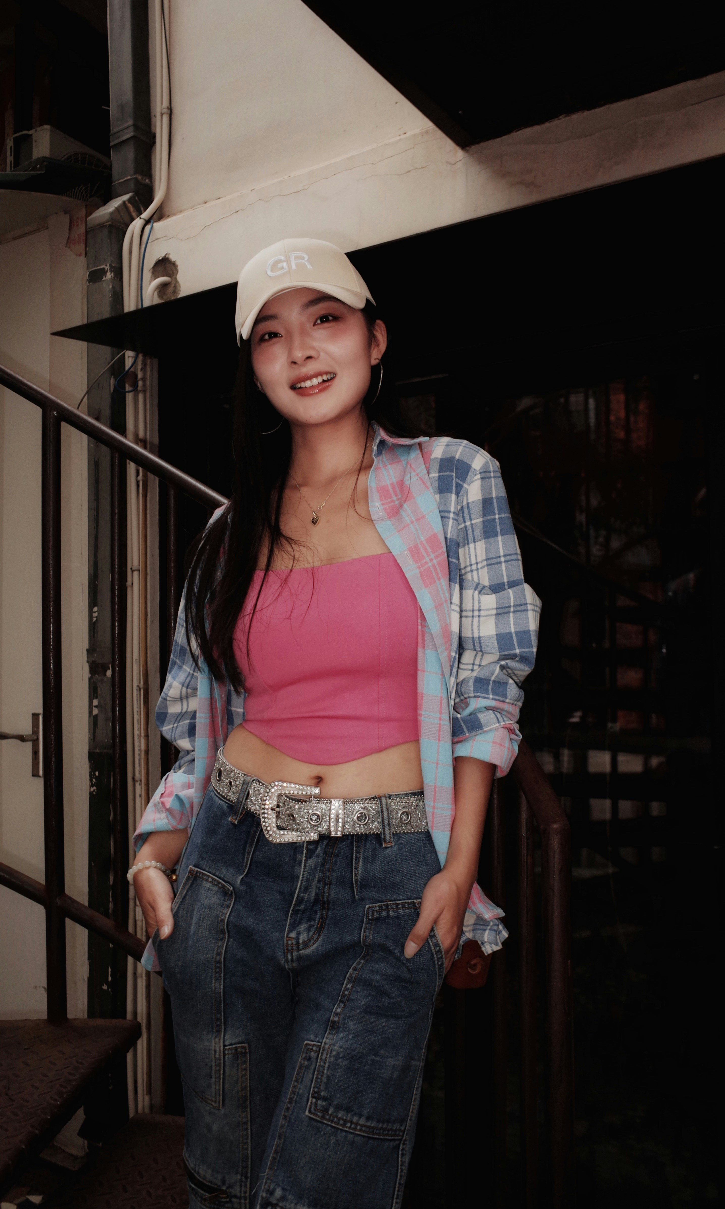 Street-Ready Pink: A Casual Portrait in Denim and Plaid
