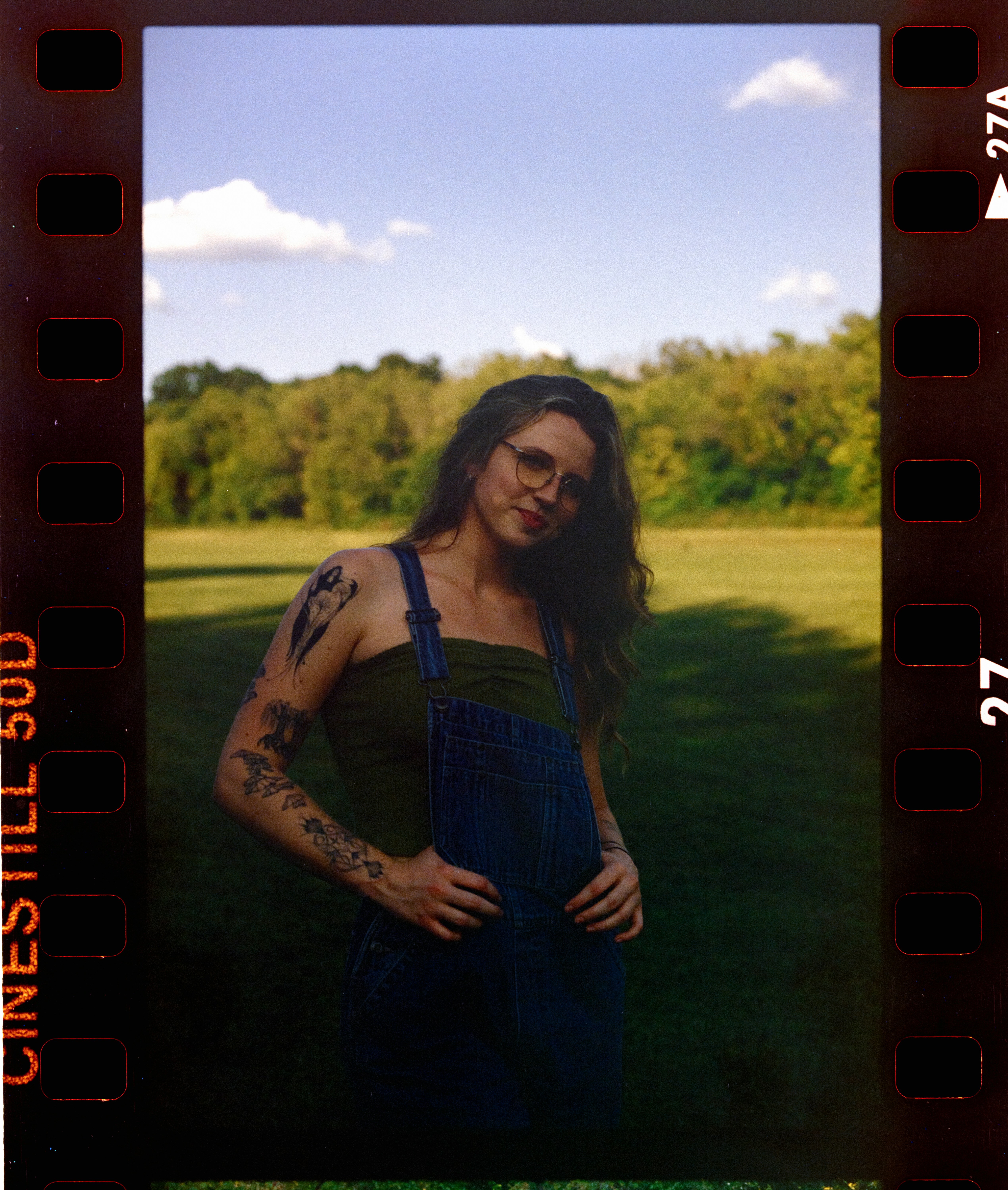 Sunlit Denim: Portrait of Confidence in a Park