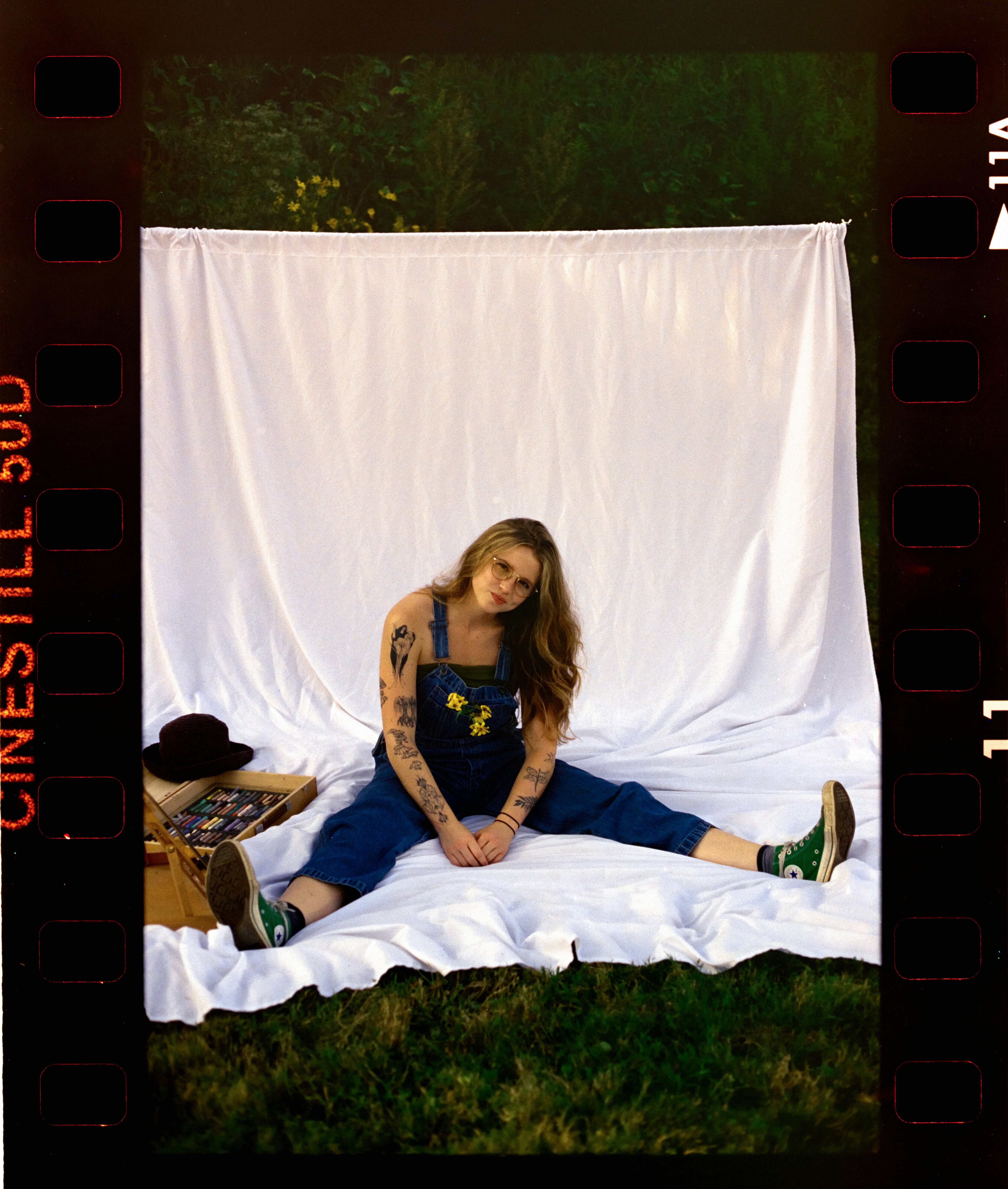 Grass-Stage Portrait Framed by a Vintage Film Strip