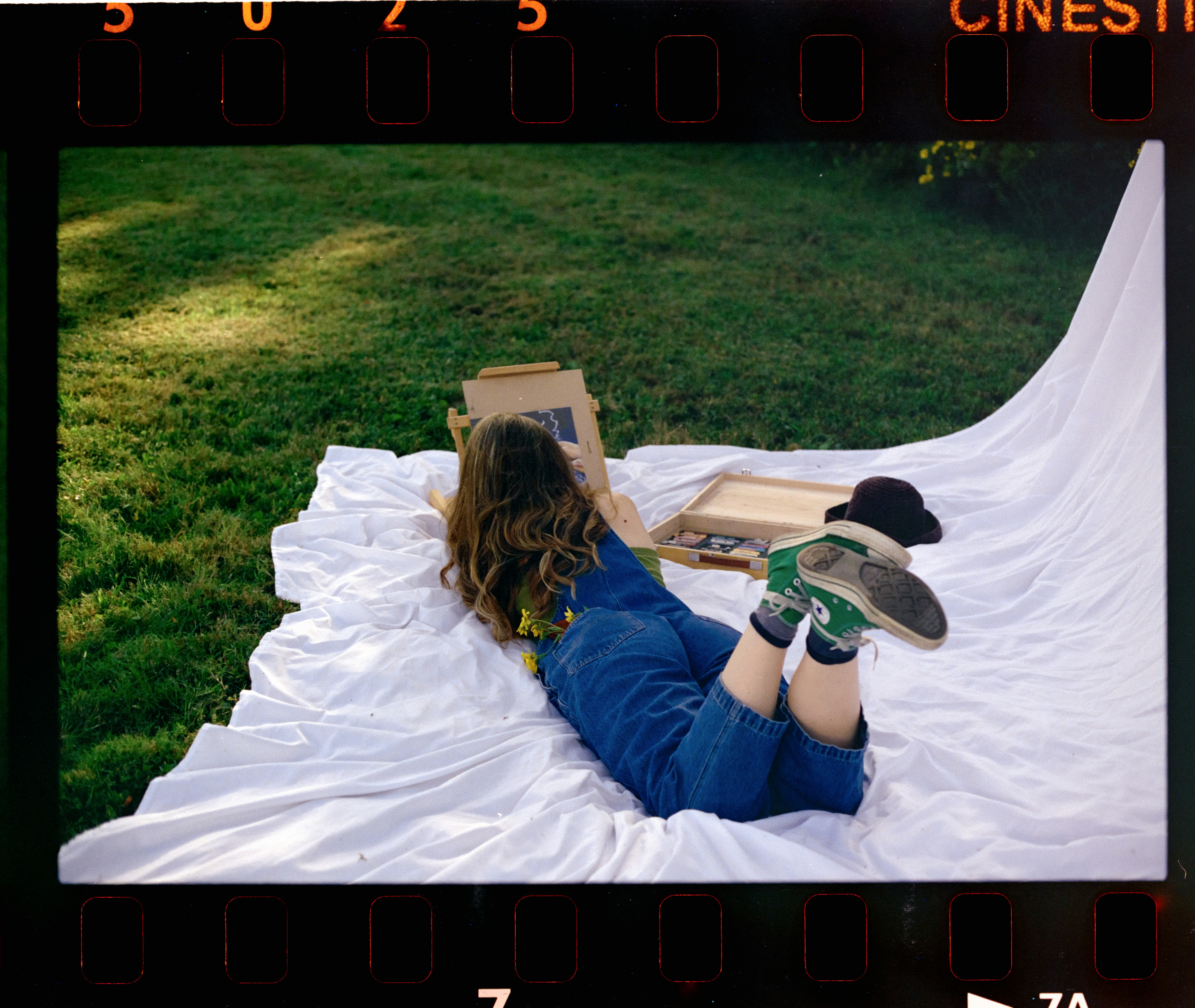 Sunlit Blanket Portrait: A Quiet Studio in the Grass