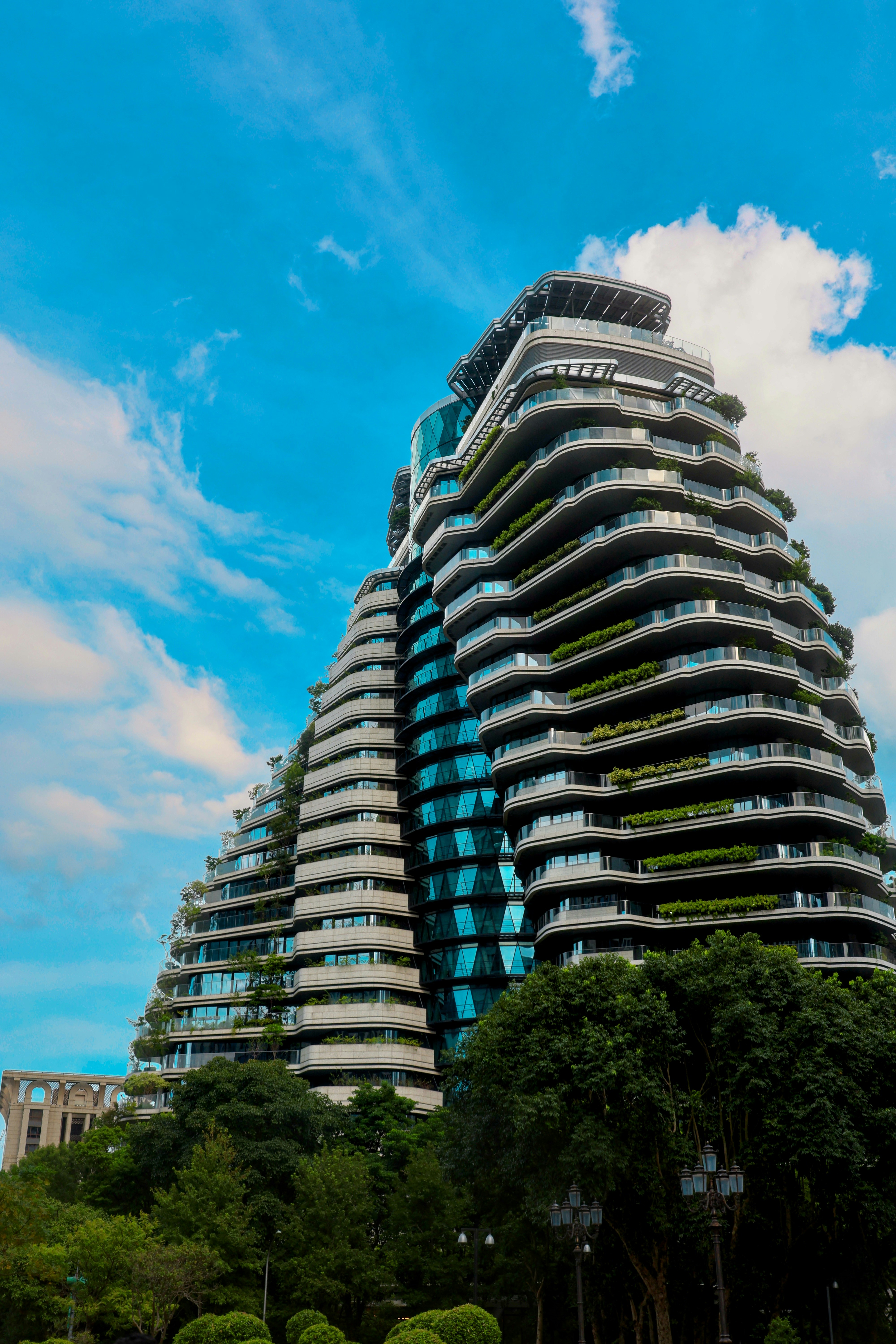 Verdant Ribbon Tower: A Green-Lined High-Rise Reaching the Sky