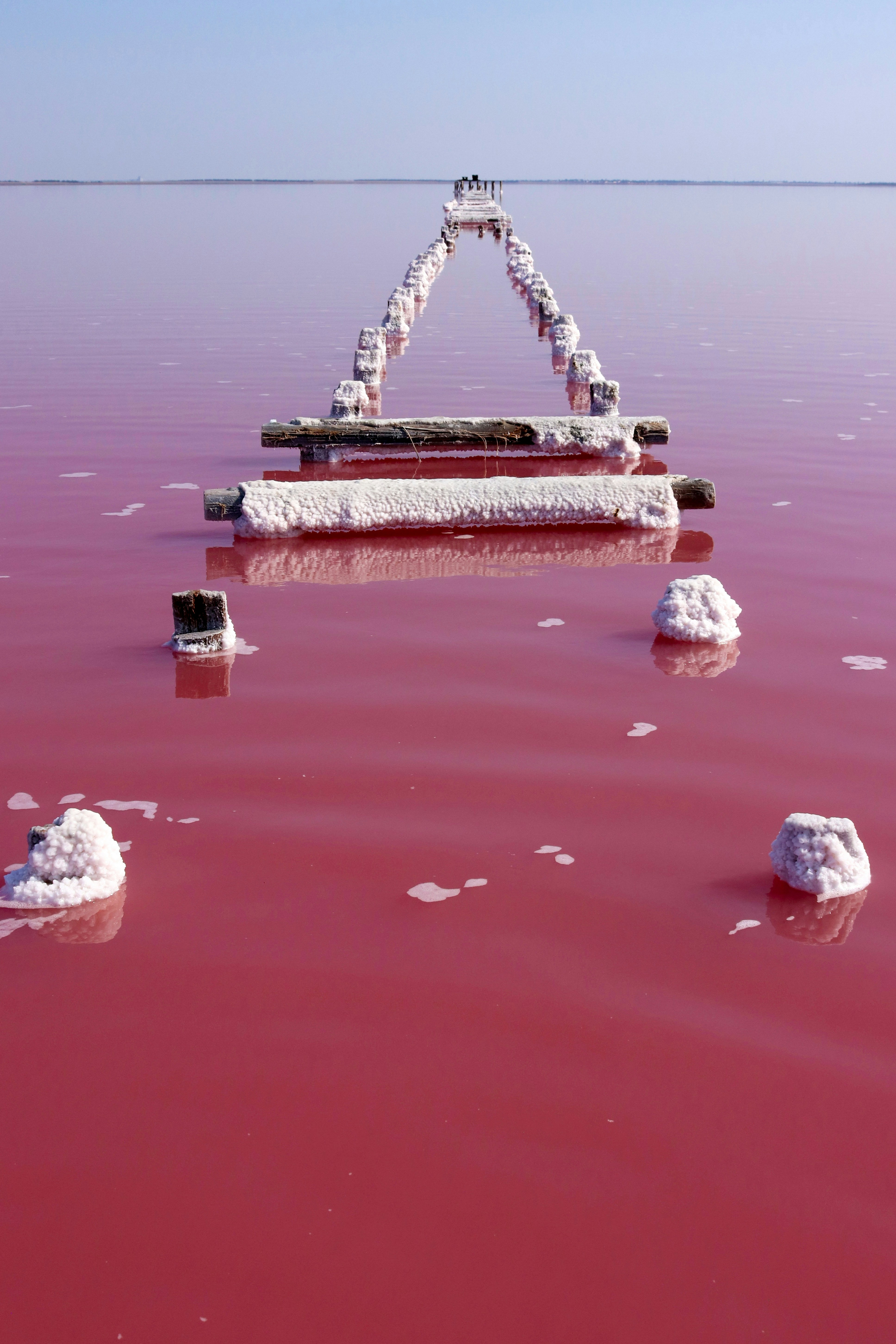 The Pink Salt Archway Reaching Over a Rosy Lake