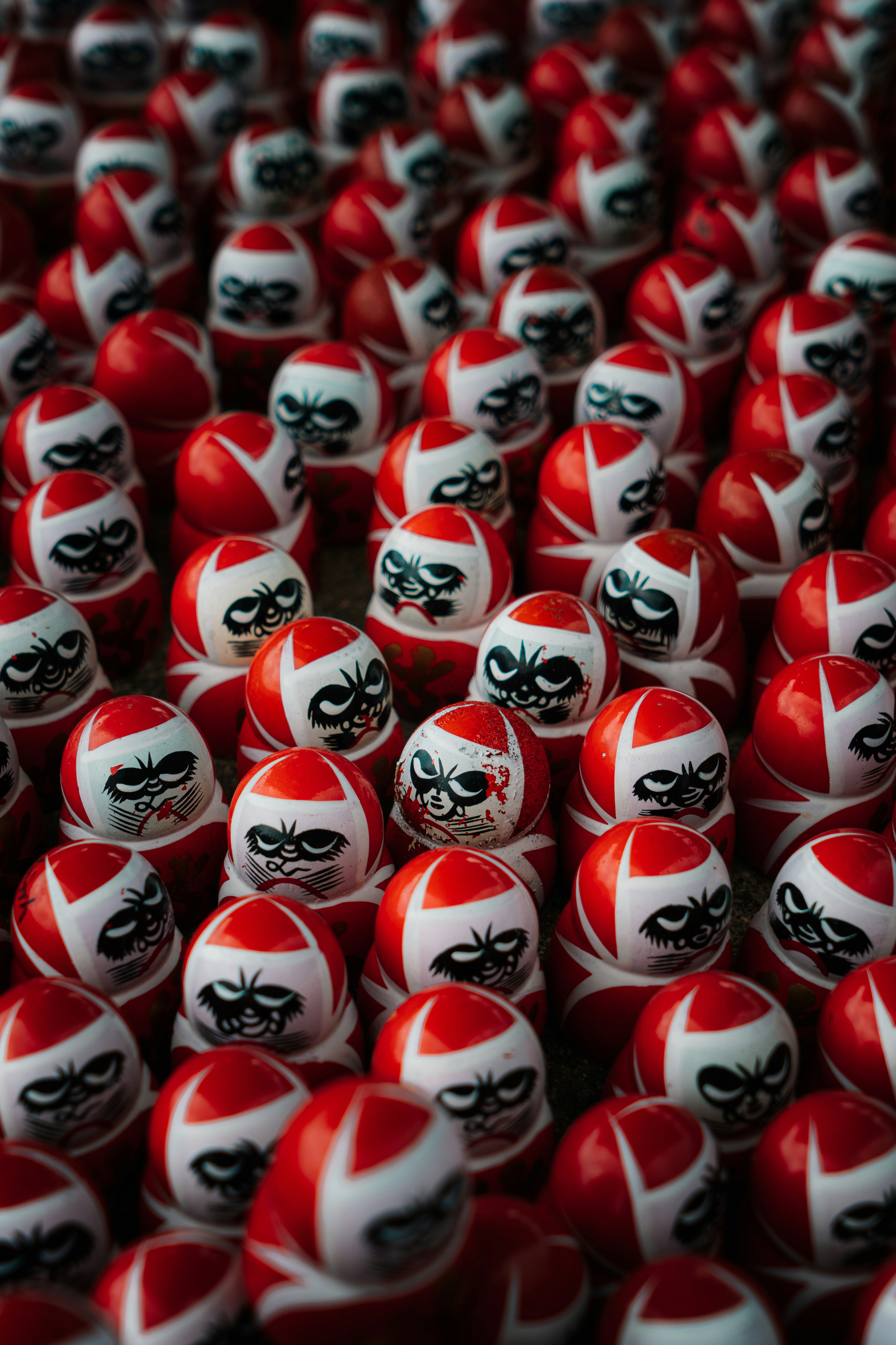 A Sea of Resilience: The Daruma Dolls' Collective Gaze