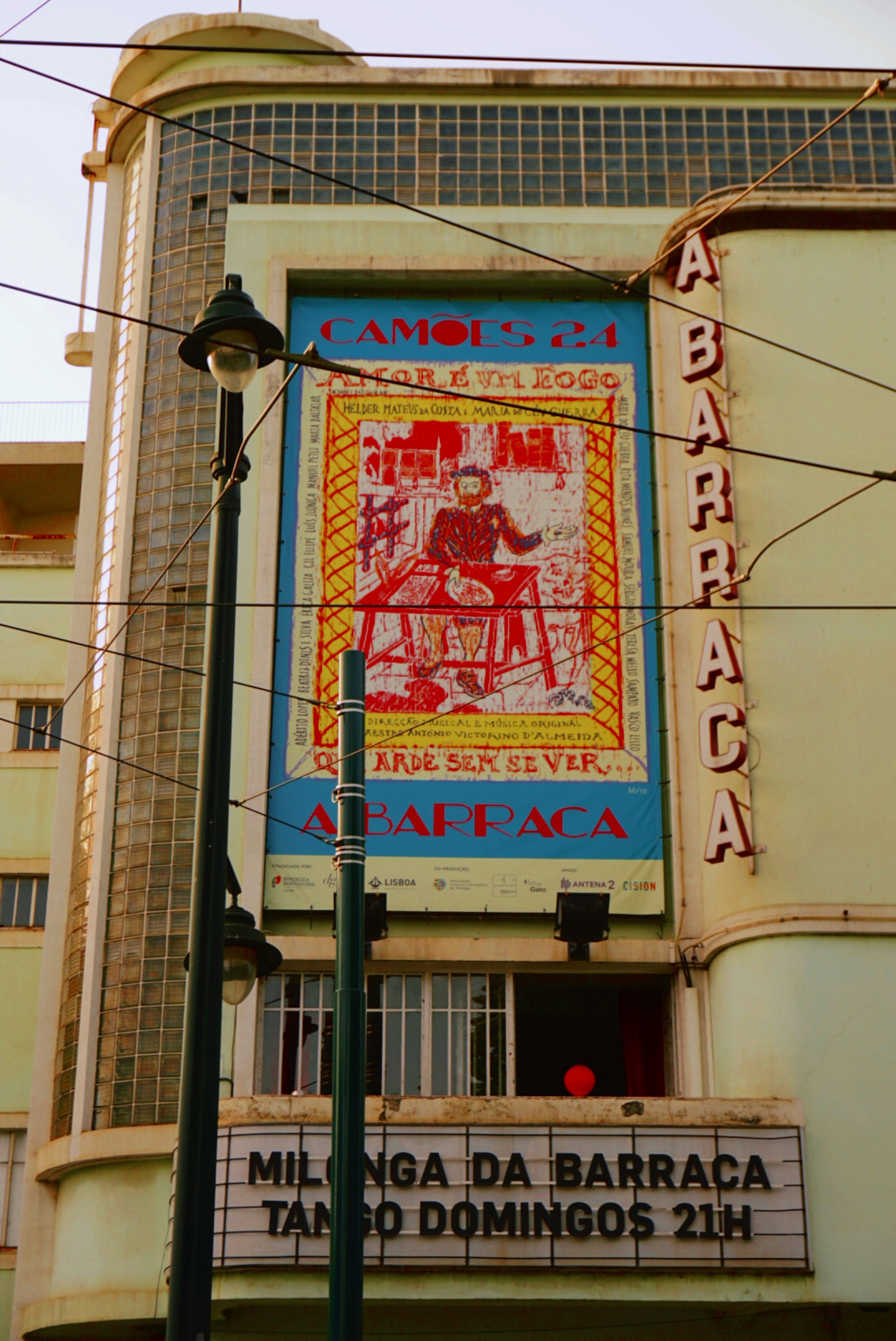 Art deco building with movie poster and marquee