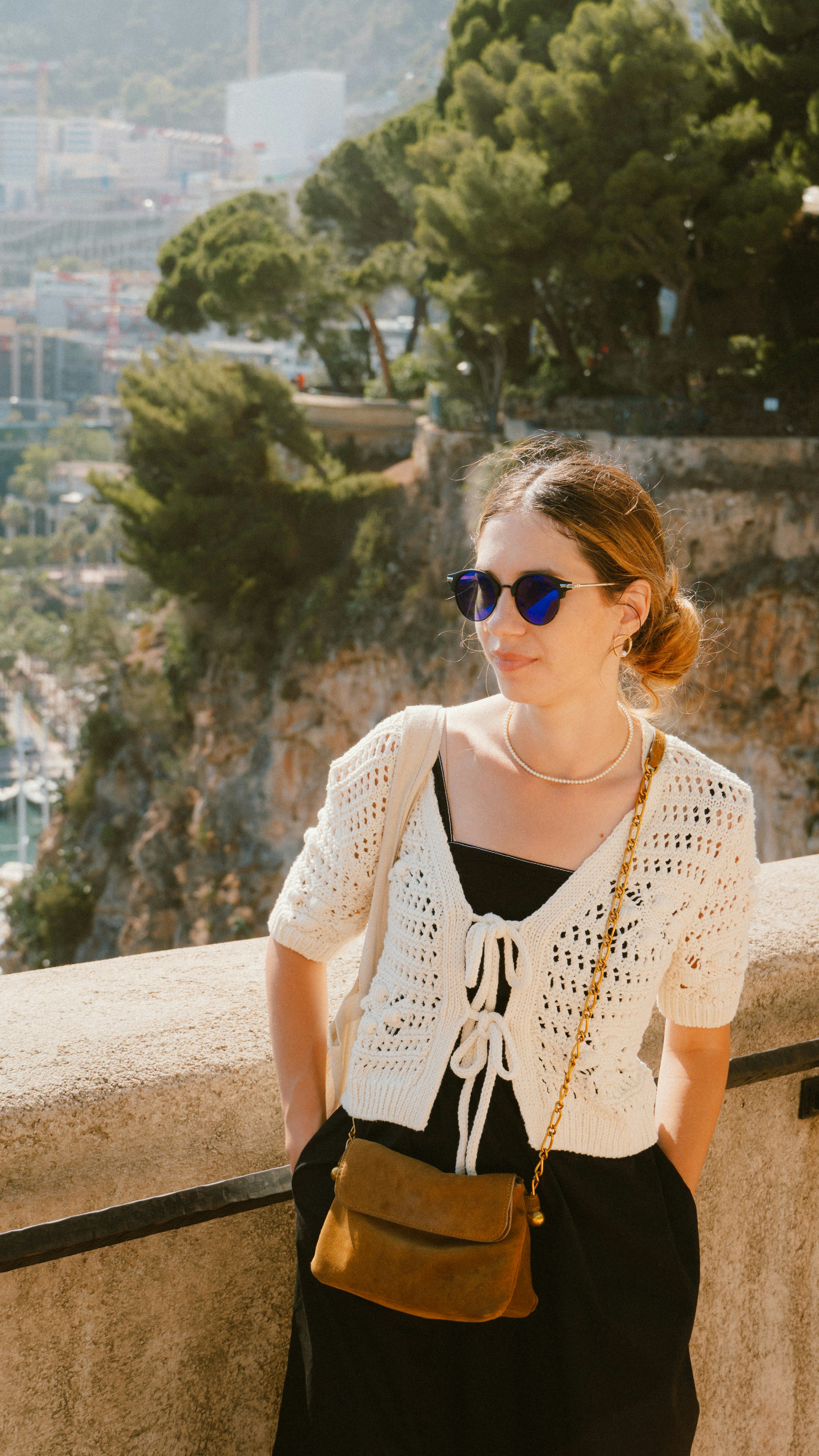 Sunlit Clifftop Portrait with Crochet Cardigan and Brown Satchel