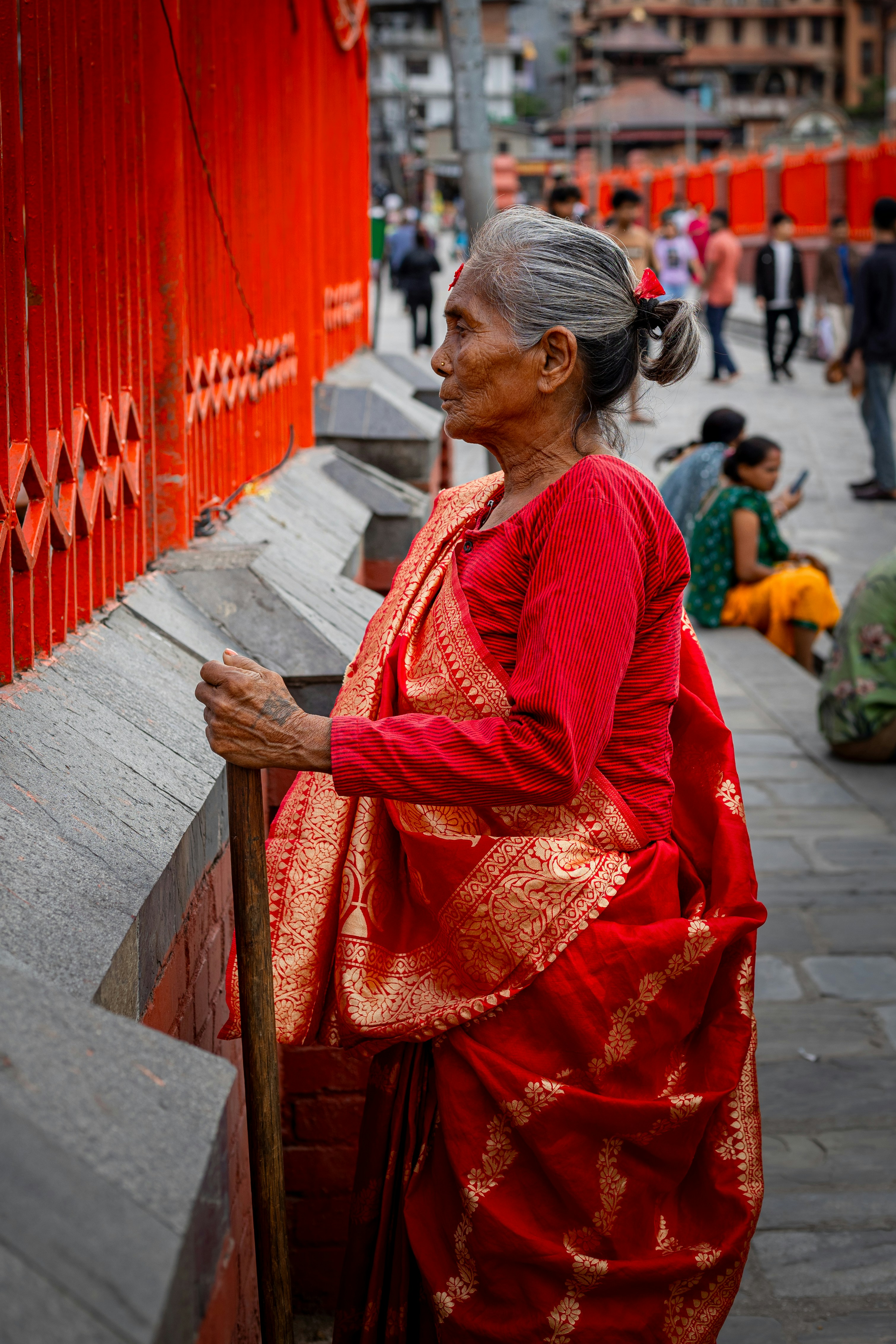 A Moment of Reflection in Vibrant Tradition