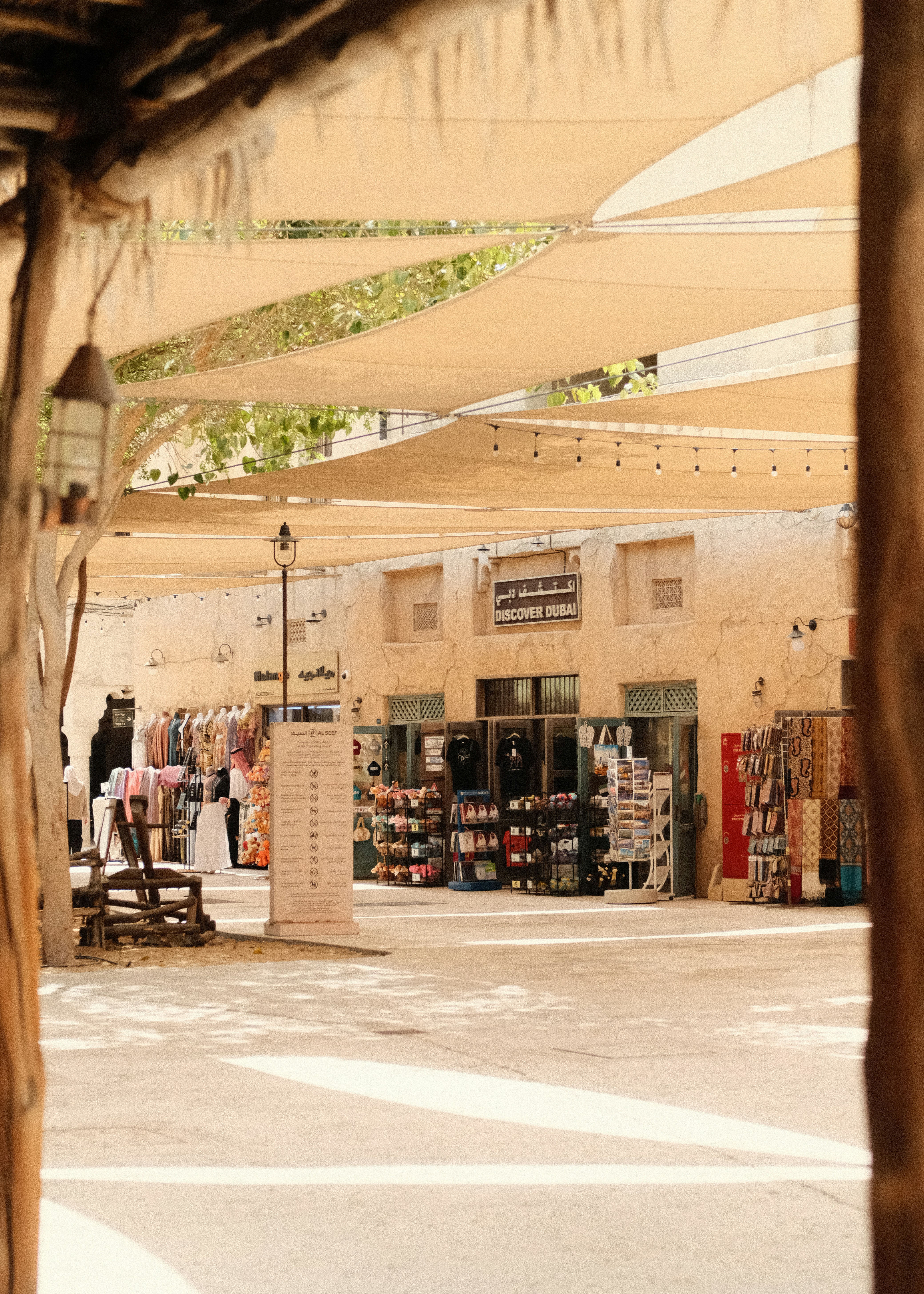 Sunlit Courtyard Bazaar Under Woven Canopies