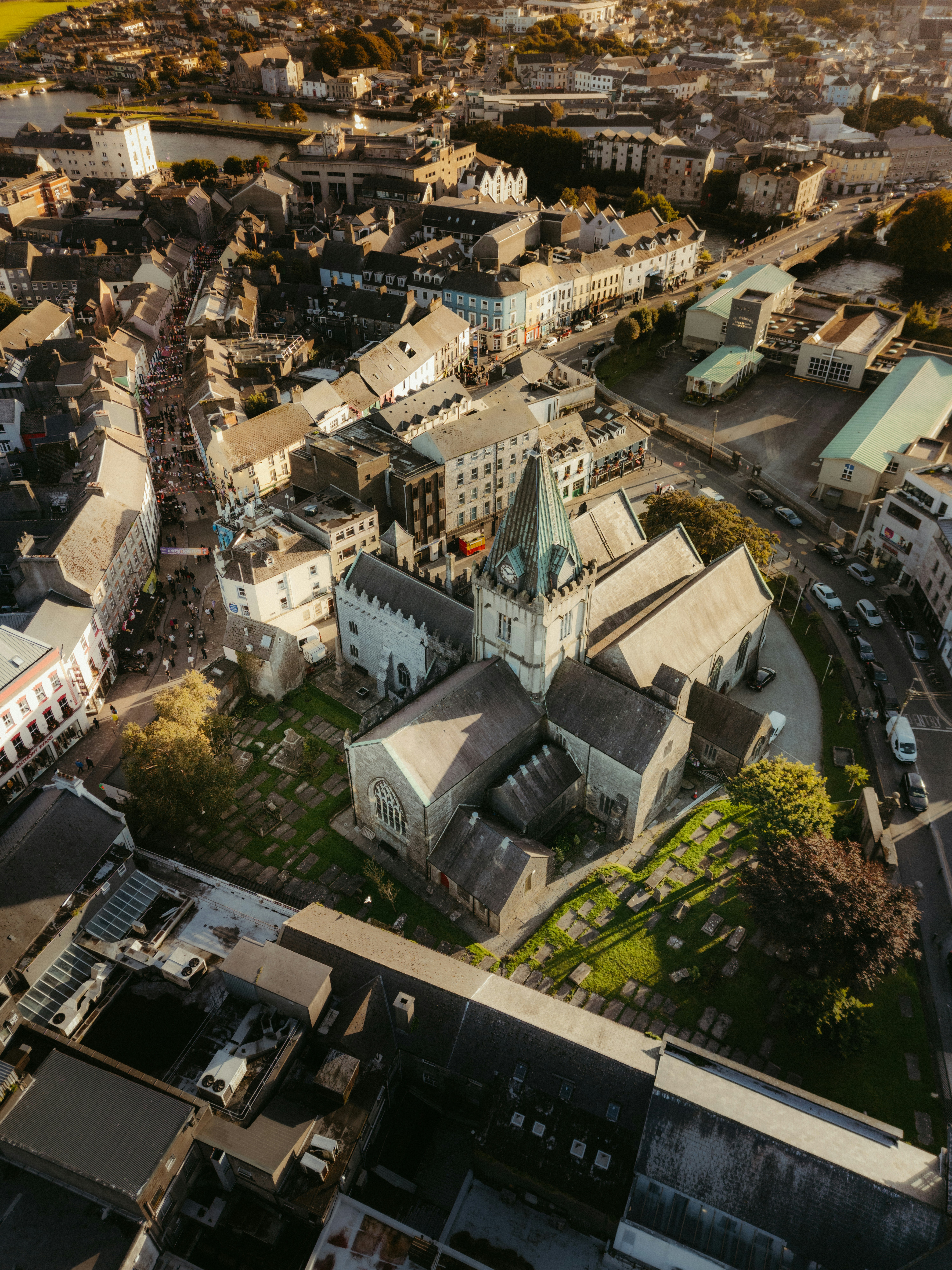 Aerial view of a historic church and town buildings.