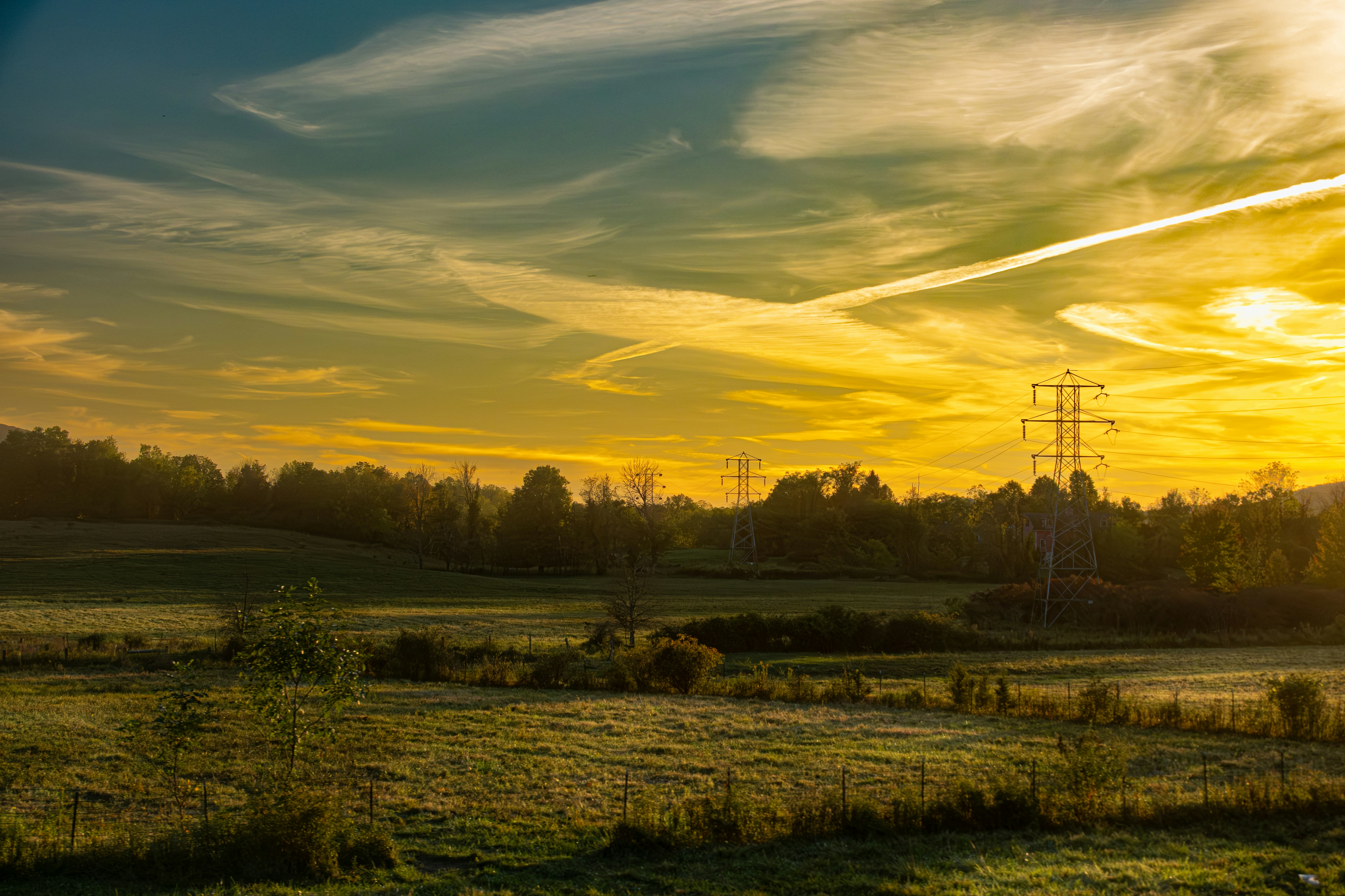 Golden Hour Symphony Over Rolling Fields