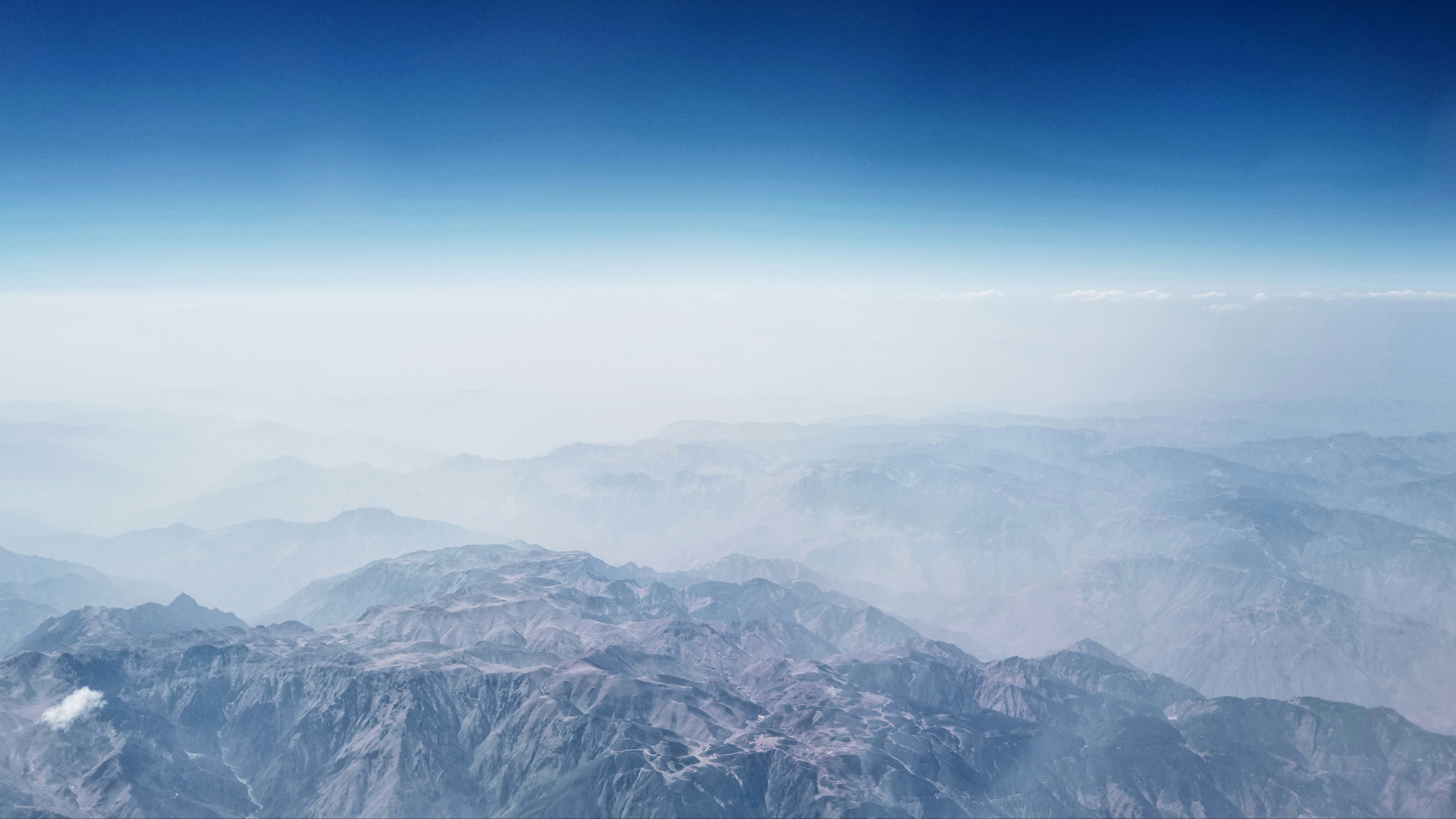 Whispers of the Horizon: A Mountainous Tapestry