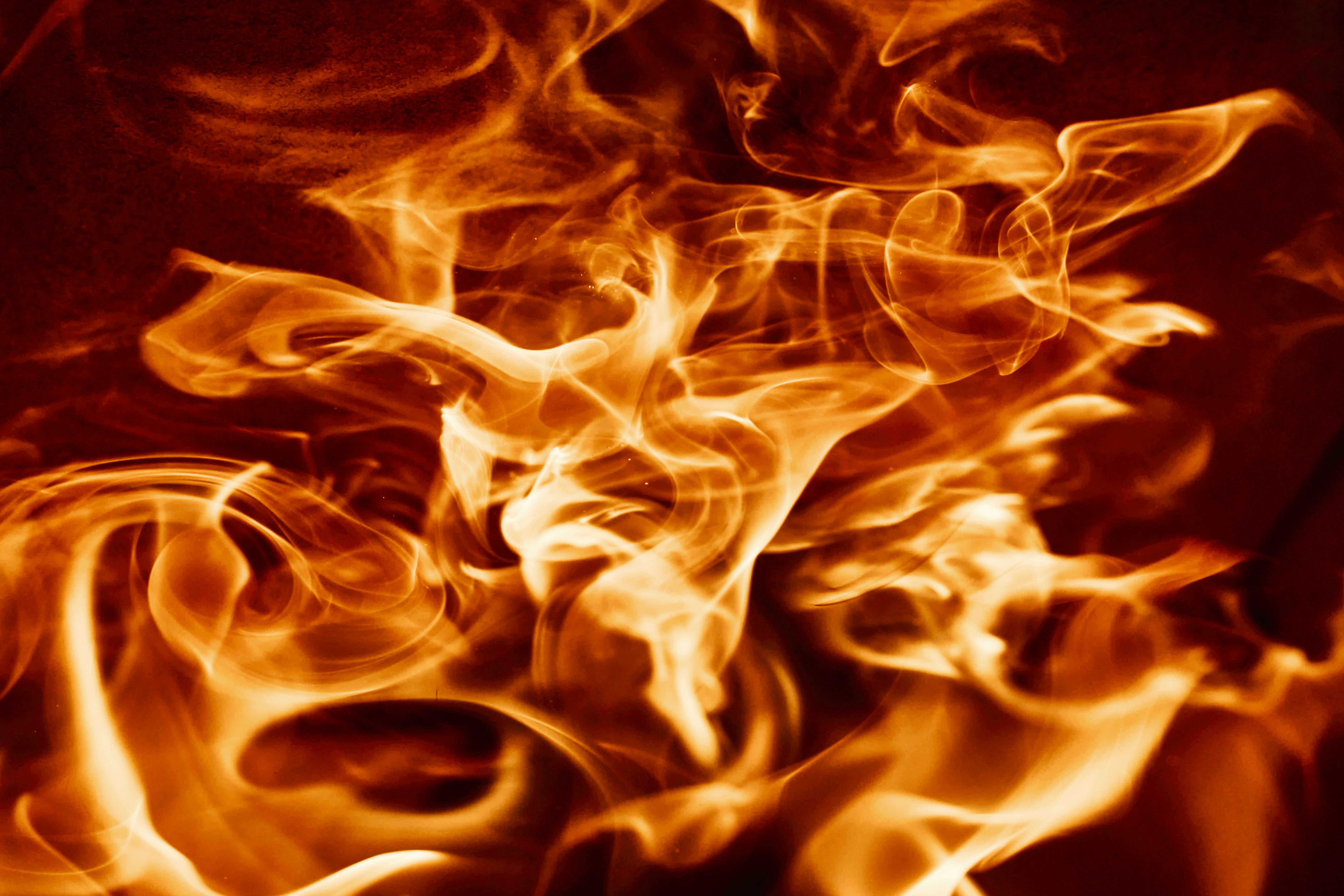 Vibrant flames engulfing a dark background