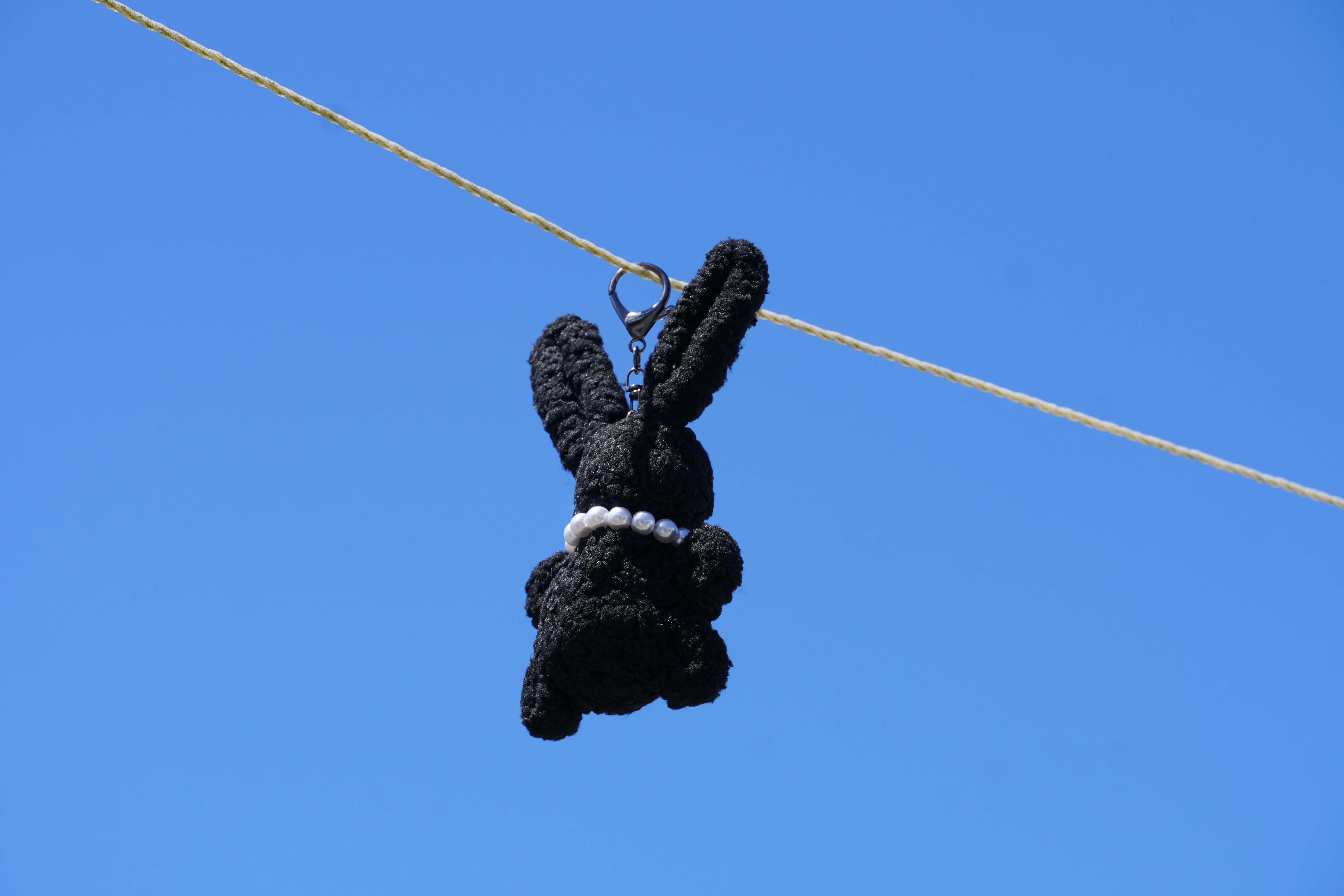 Whimsical Charm: The Hanging Bunny