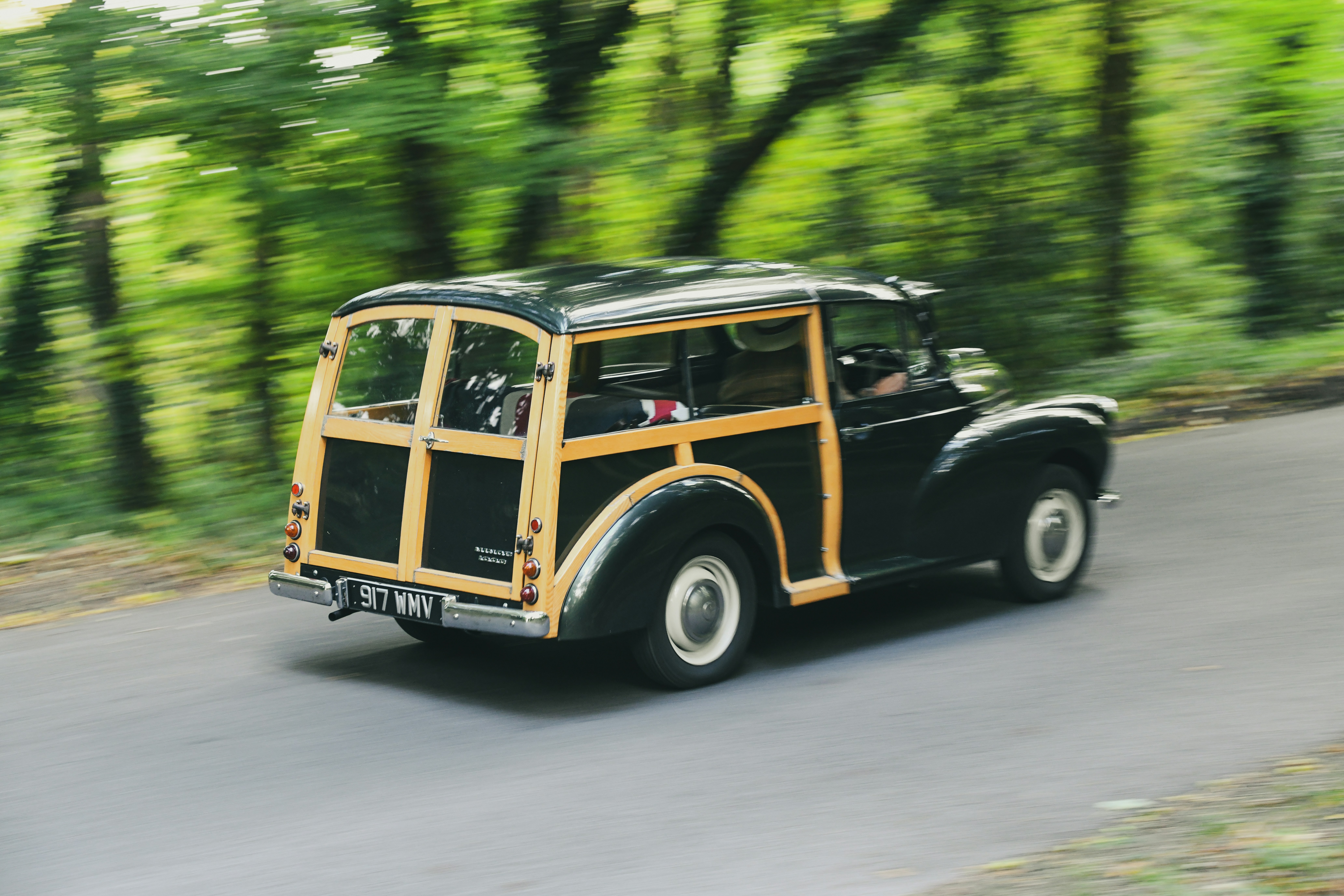 Vintage Jaguar-like Run: A Wooden-Trimmed Classic in Motion