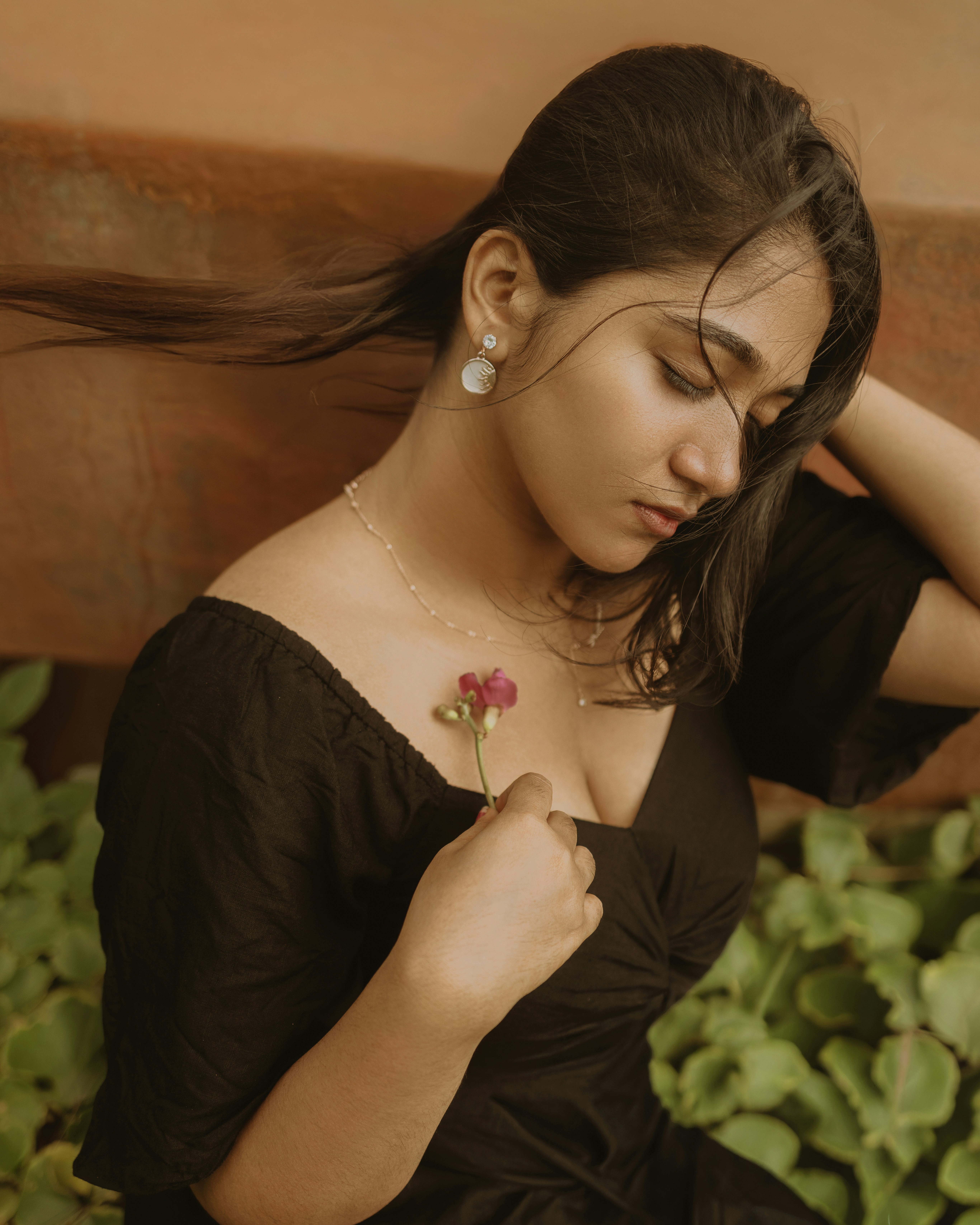 Whispers in Warm Light: Portrait with a Rose