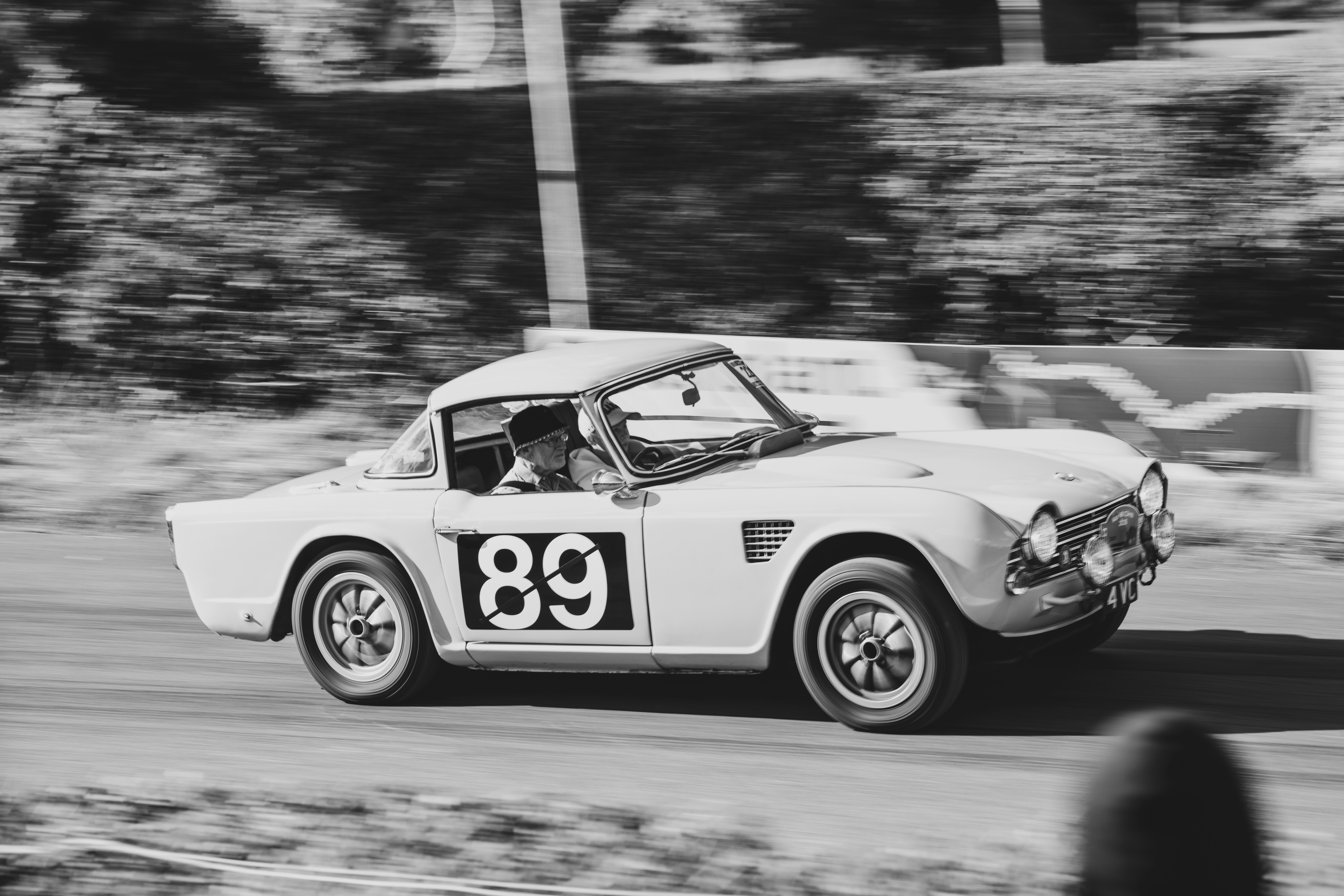 Number 89 Screams Across Time: A Vintage Race Car in Motion