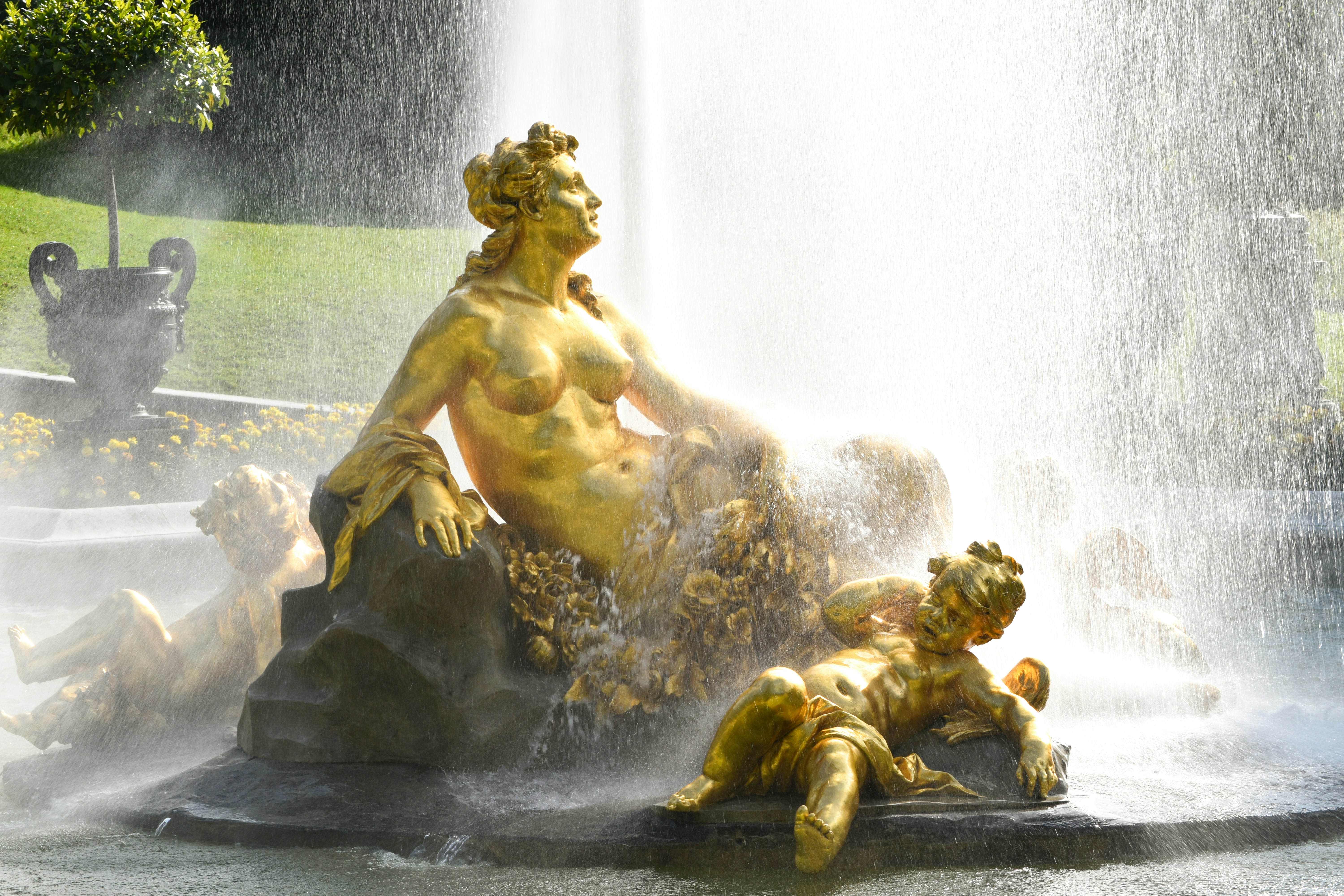 Golden Serenity: A Fountain's Embrace