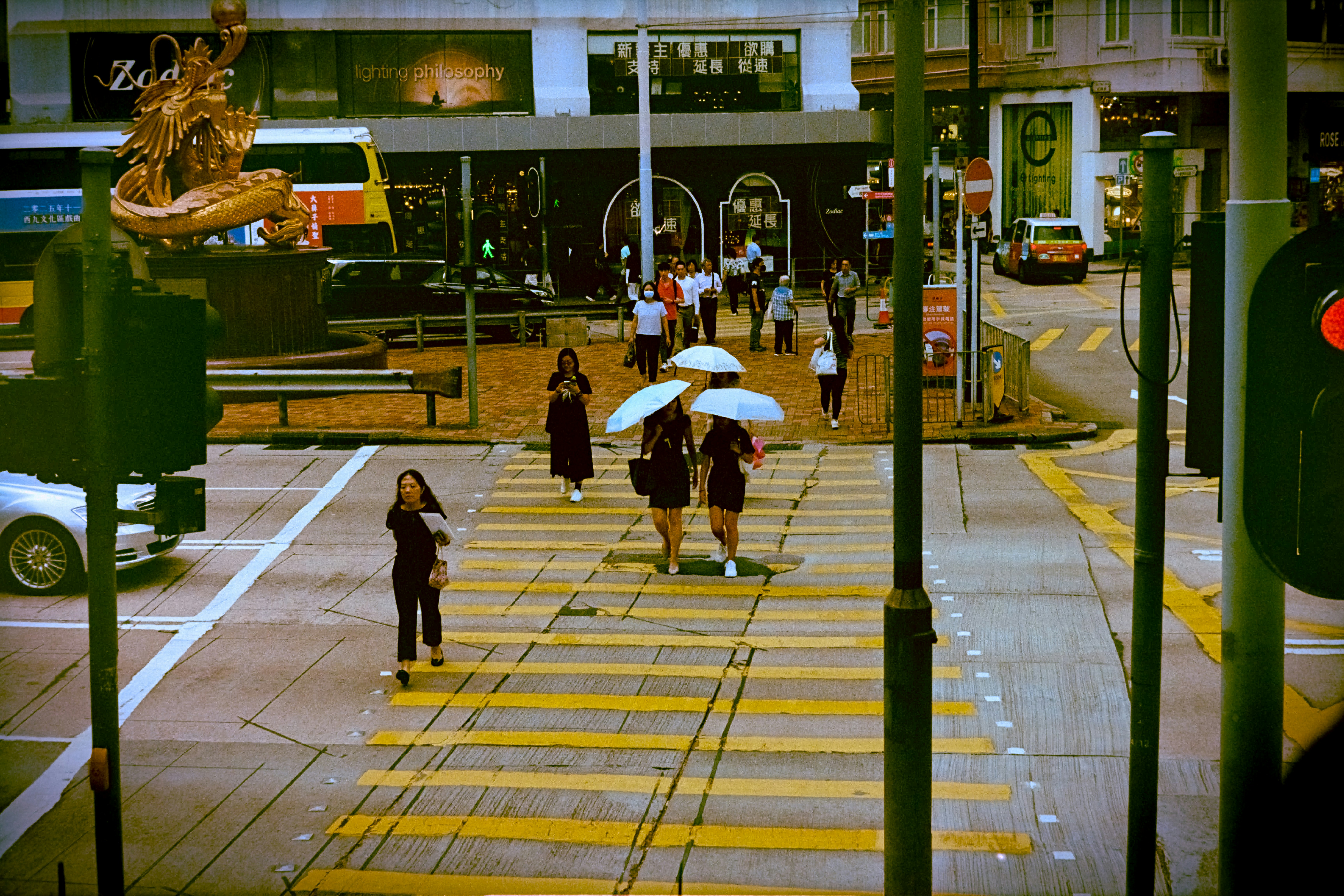 Urban Melody: A Dance of Umbrellas and Shadows