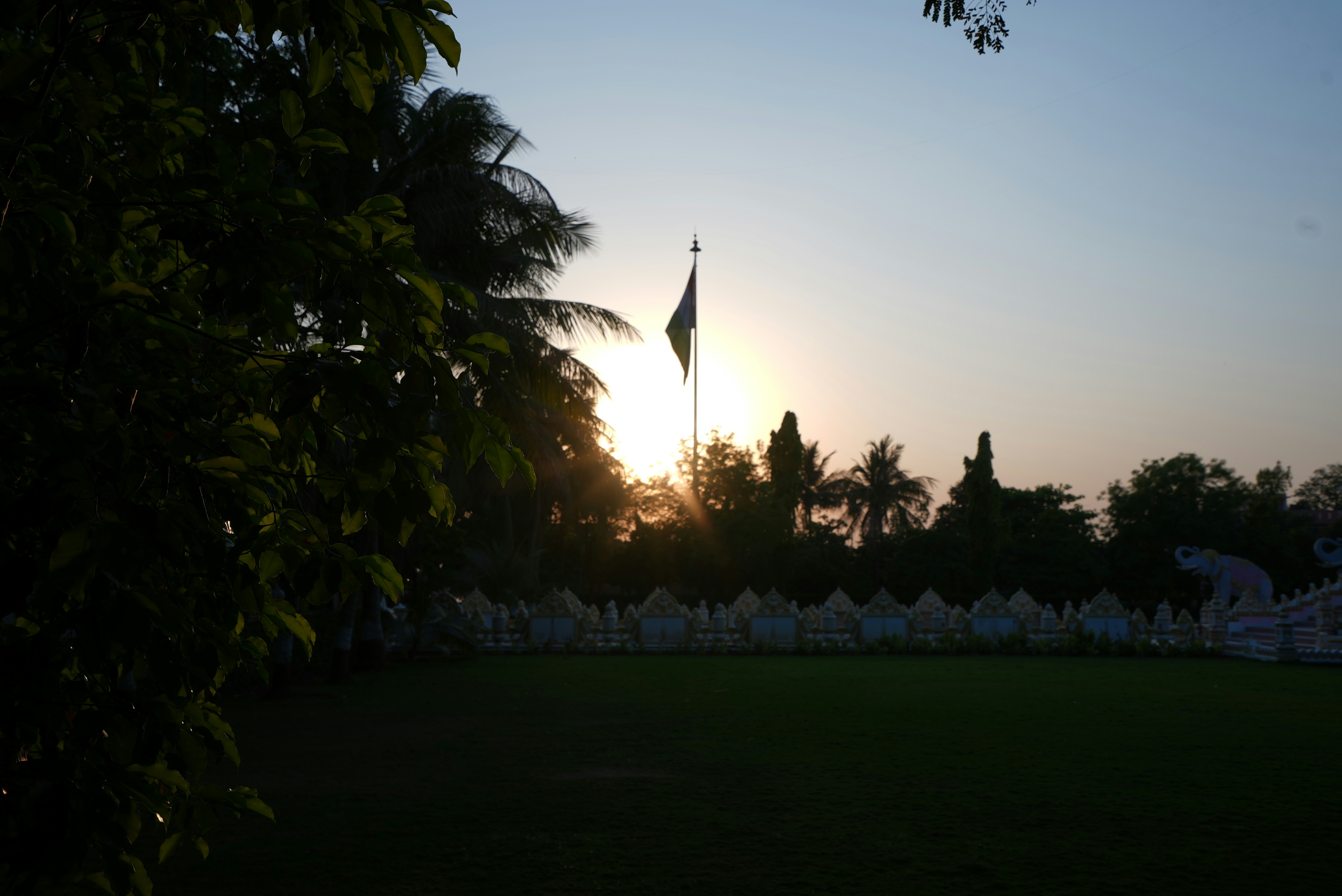 Dusk's Embrace: A Flag's Solitary Stand