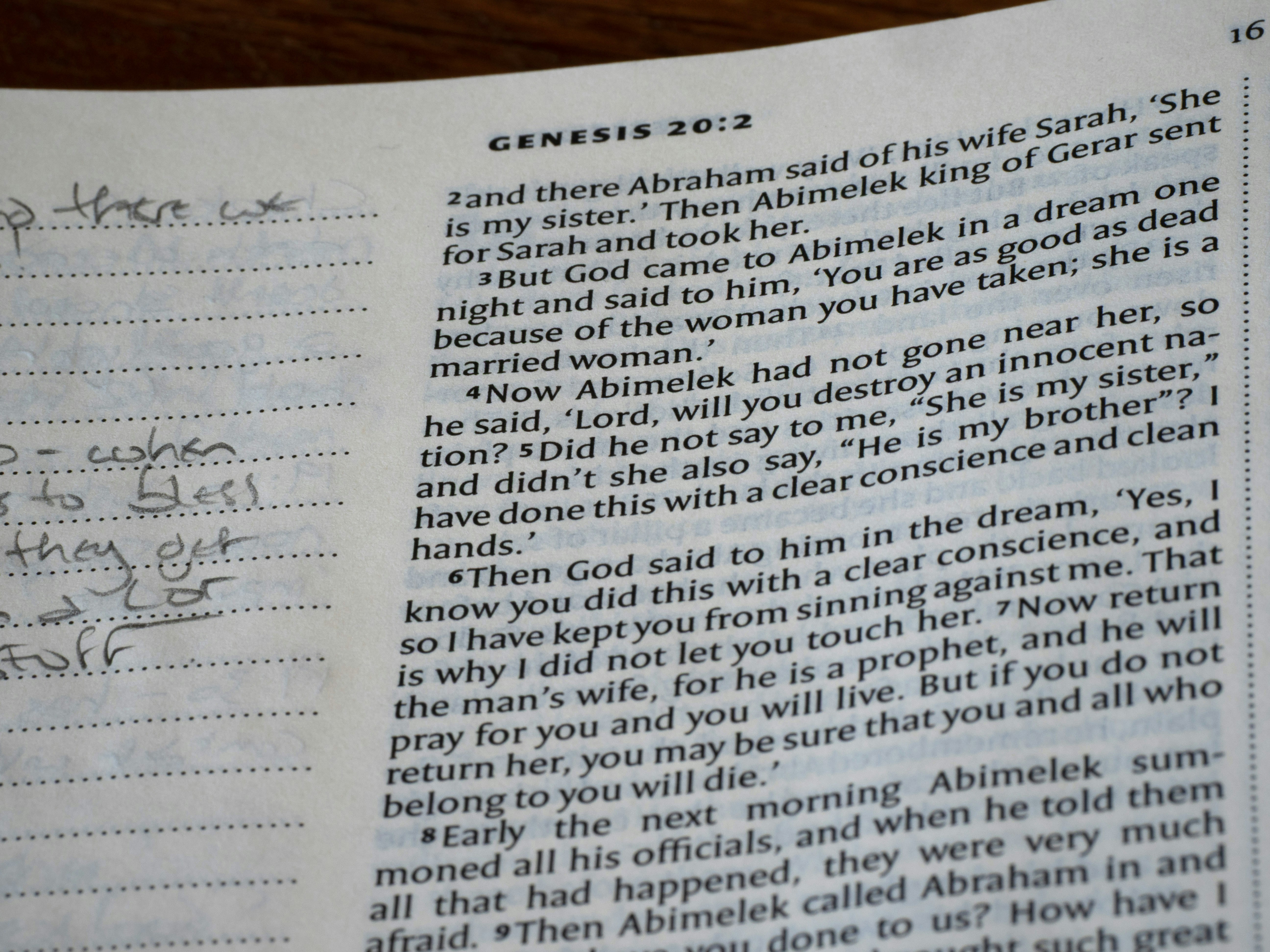 Open Bible page featuring Genesis 20:2, with handwritten notes in the margins, showcasing personal reflections on the scripture.